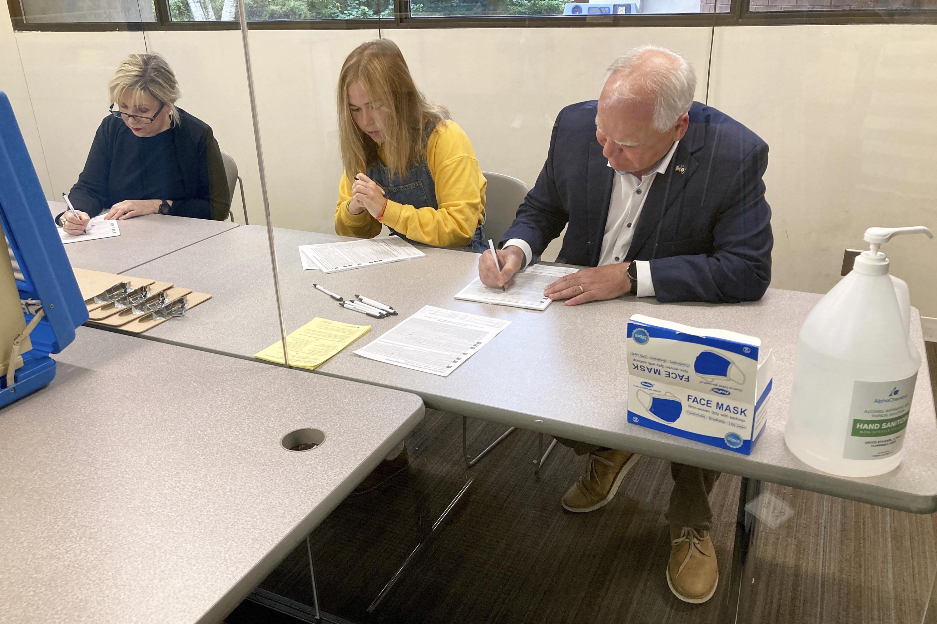 Walz votes early; defends Minnesota's election integrity | AP News