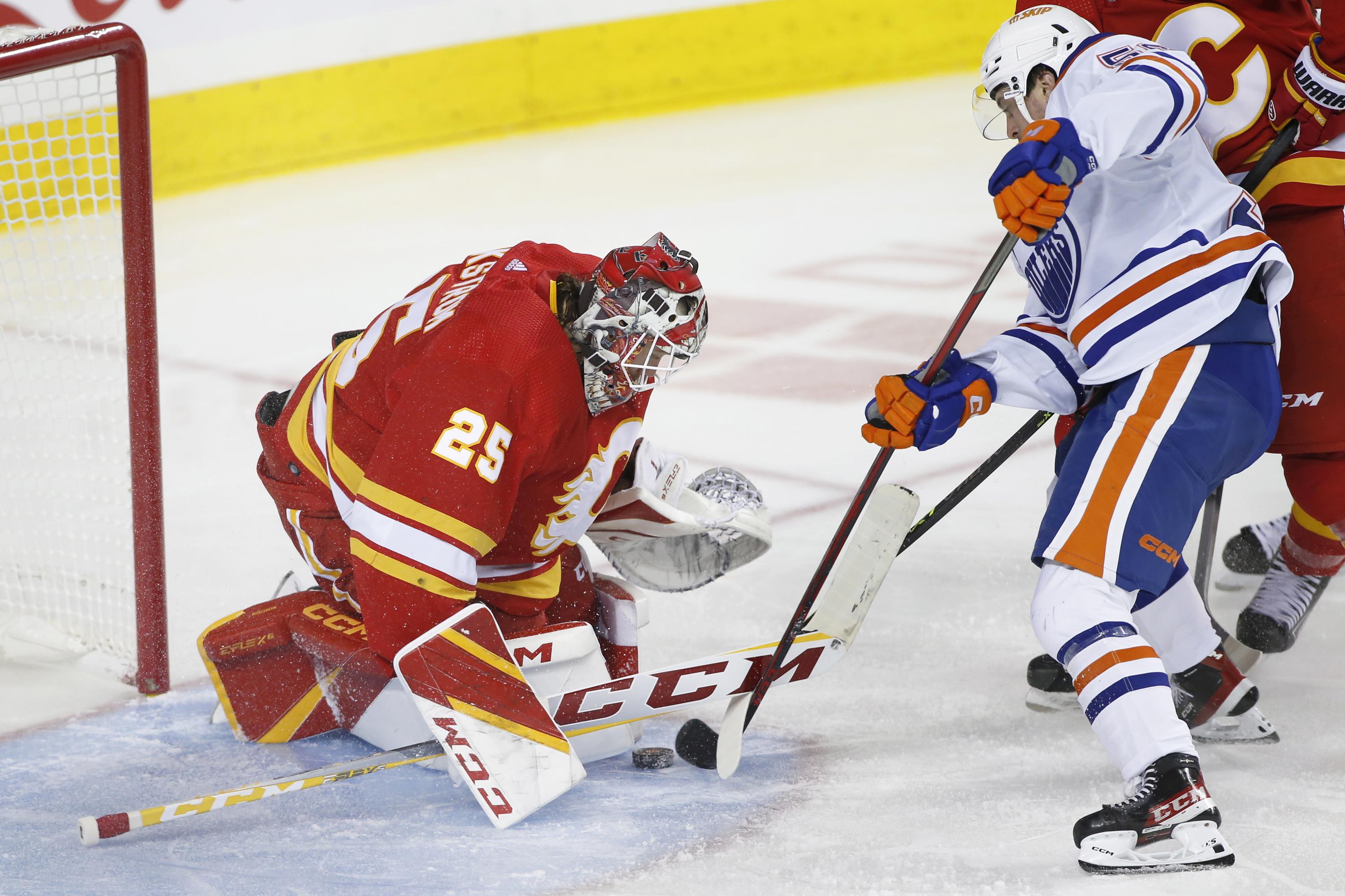 McDavid, Hyman score in 3rd, Oilers rally to beat Flames 3-2 | AP News