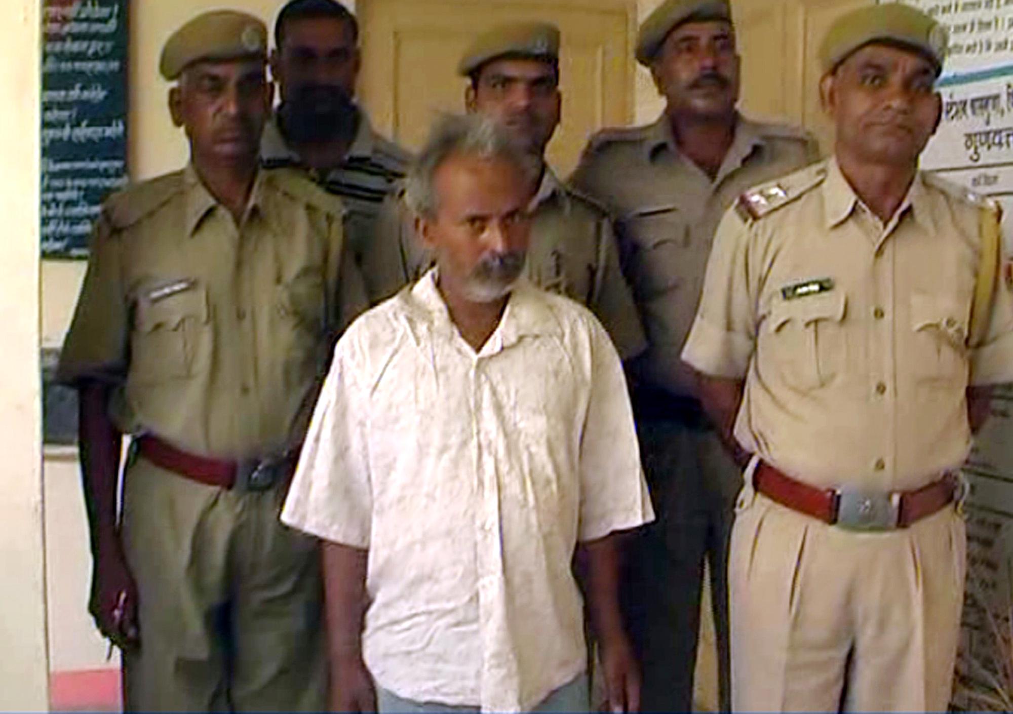 Indian man unrepentant after beheading daughter | AP News