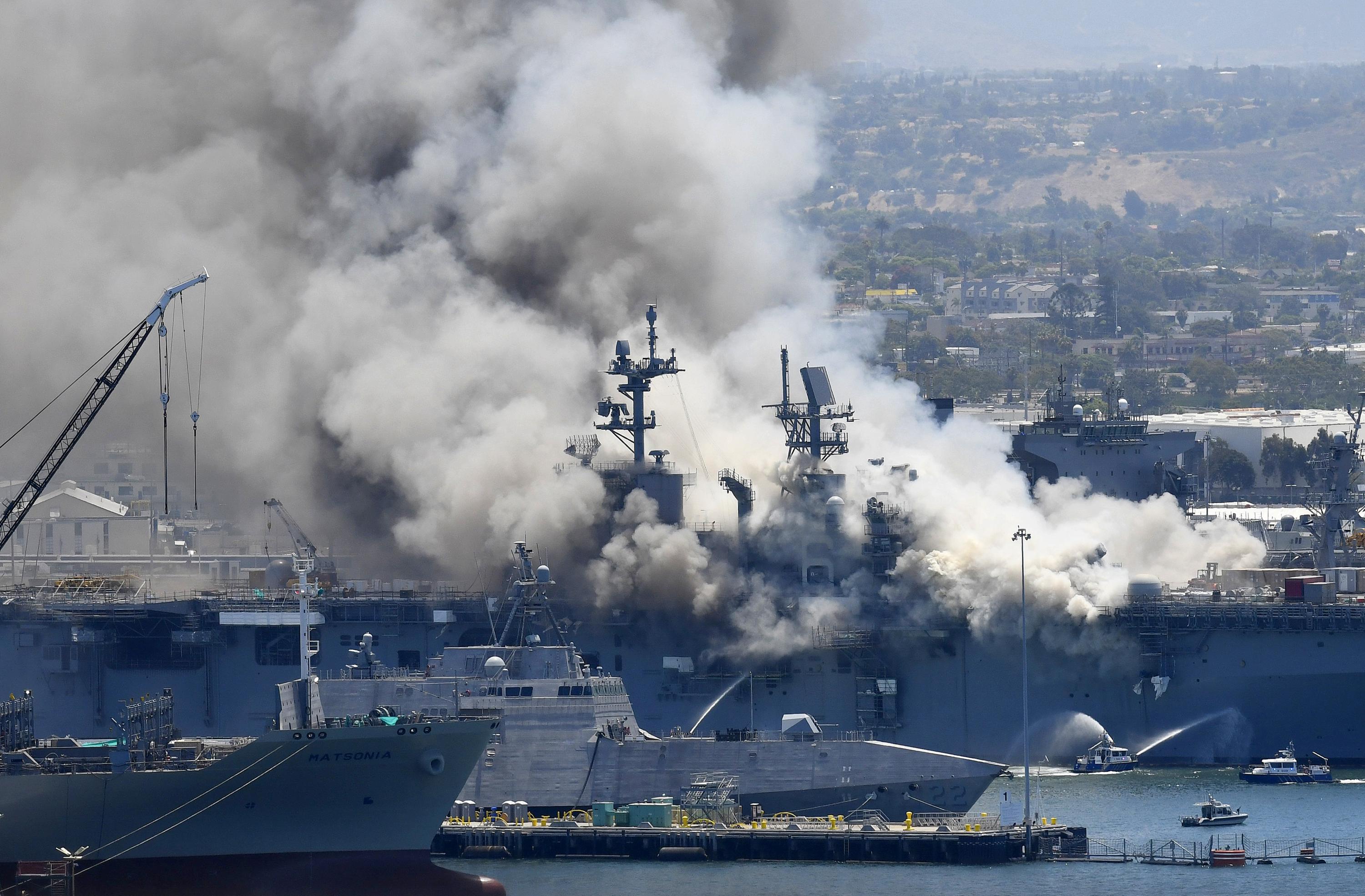 Navy charges sailor with setting fire that destroyed warship | AP News