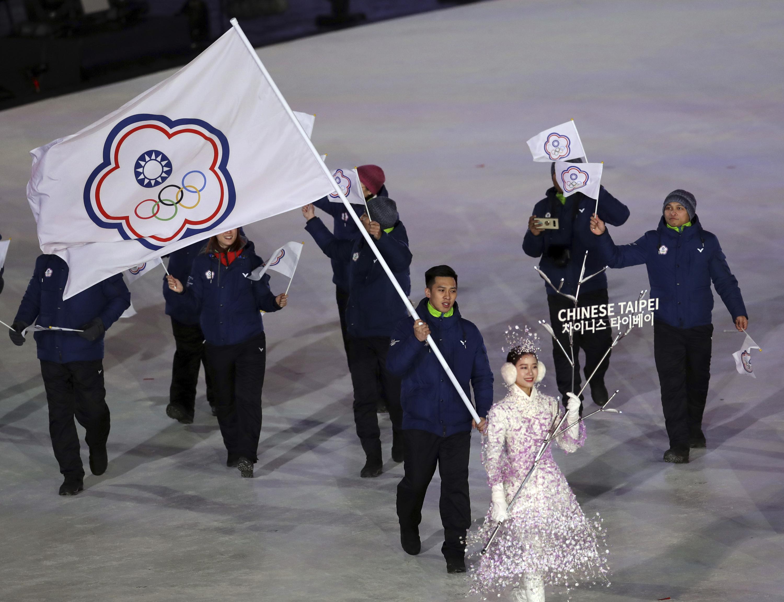 Taiwan team relents, will attend Olympic ceremonies in China | AP News