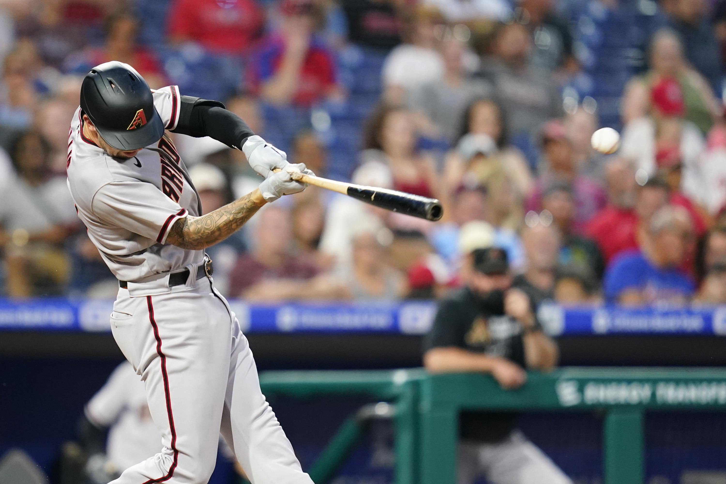 Diamondbacks a perfect 4-0 against Phillies after 8-7 win | AP News