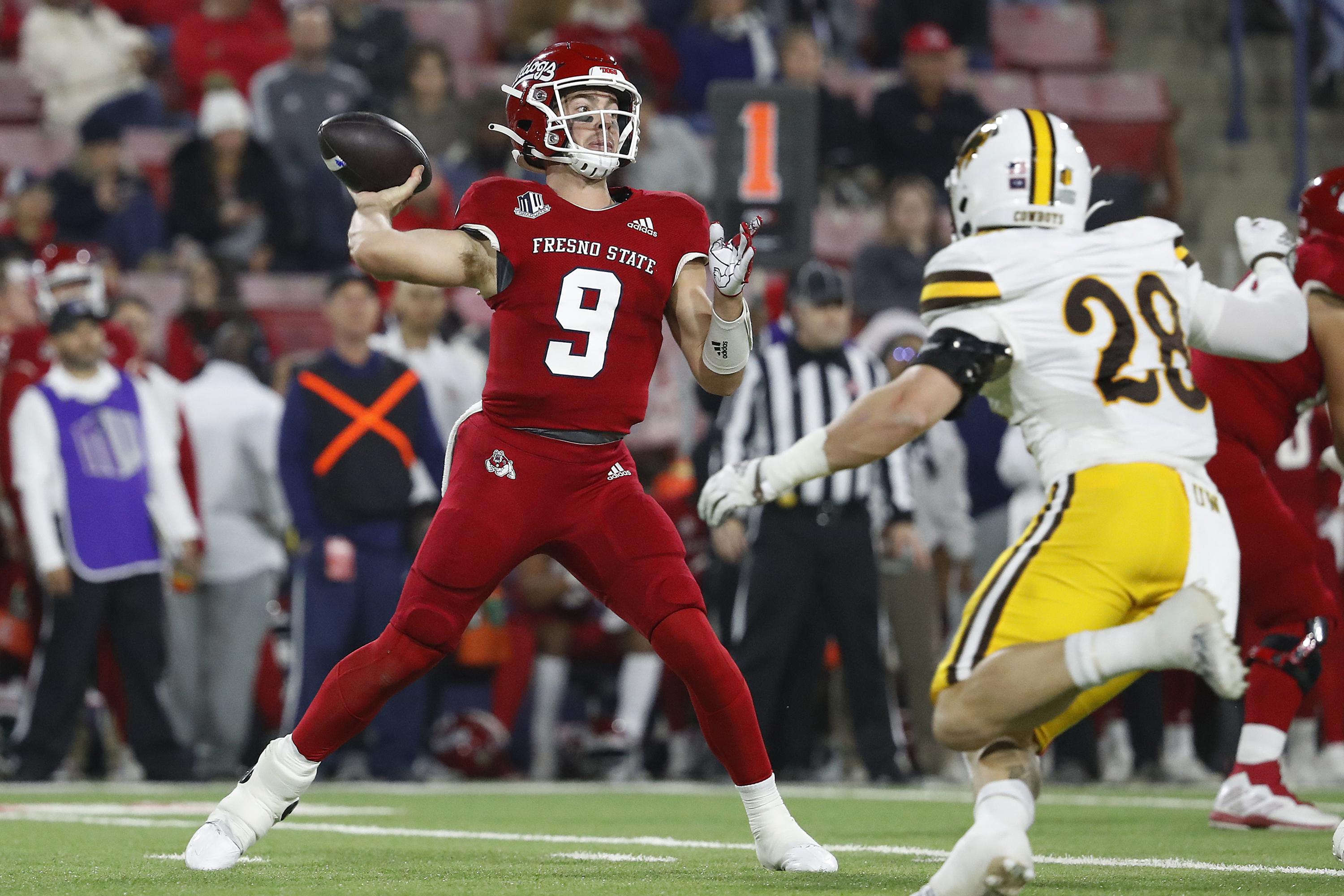Mims runs for 3 TDs, Fresno St. beats Wyoming 30-0 | AP News