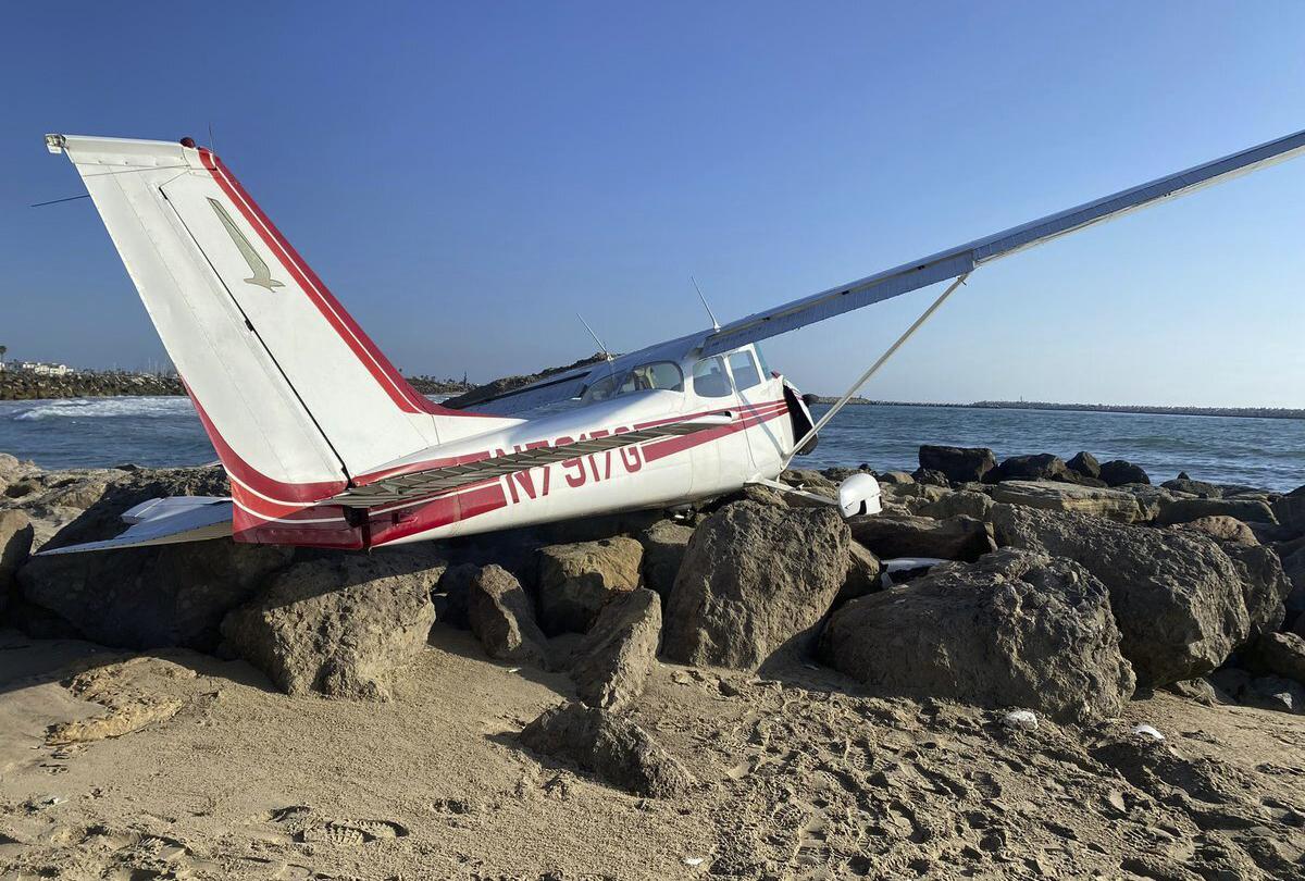 Small plane crashes onto Southern California beach's jetty | AP News