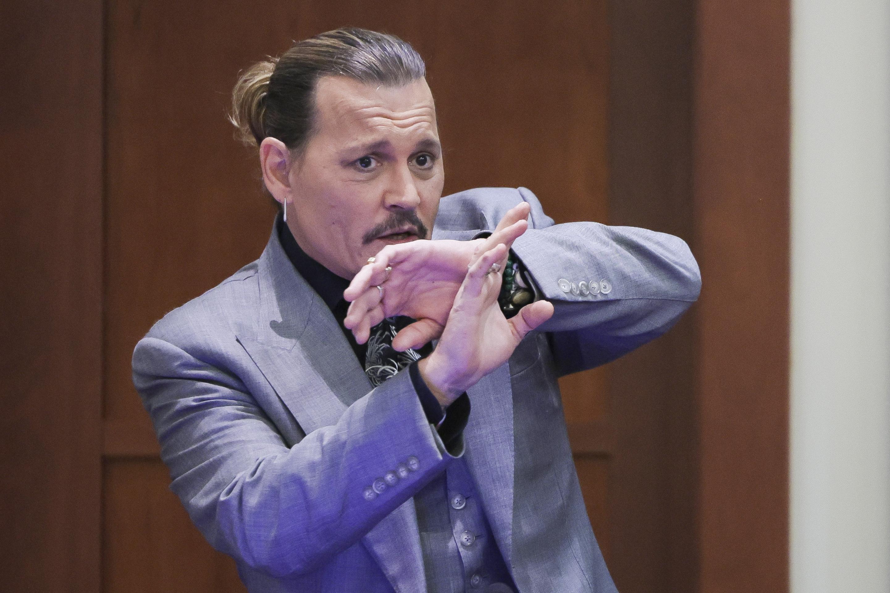 EXPLAINER: Johnny Depp's wild testimony, cross-examination | AP News
