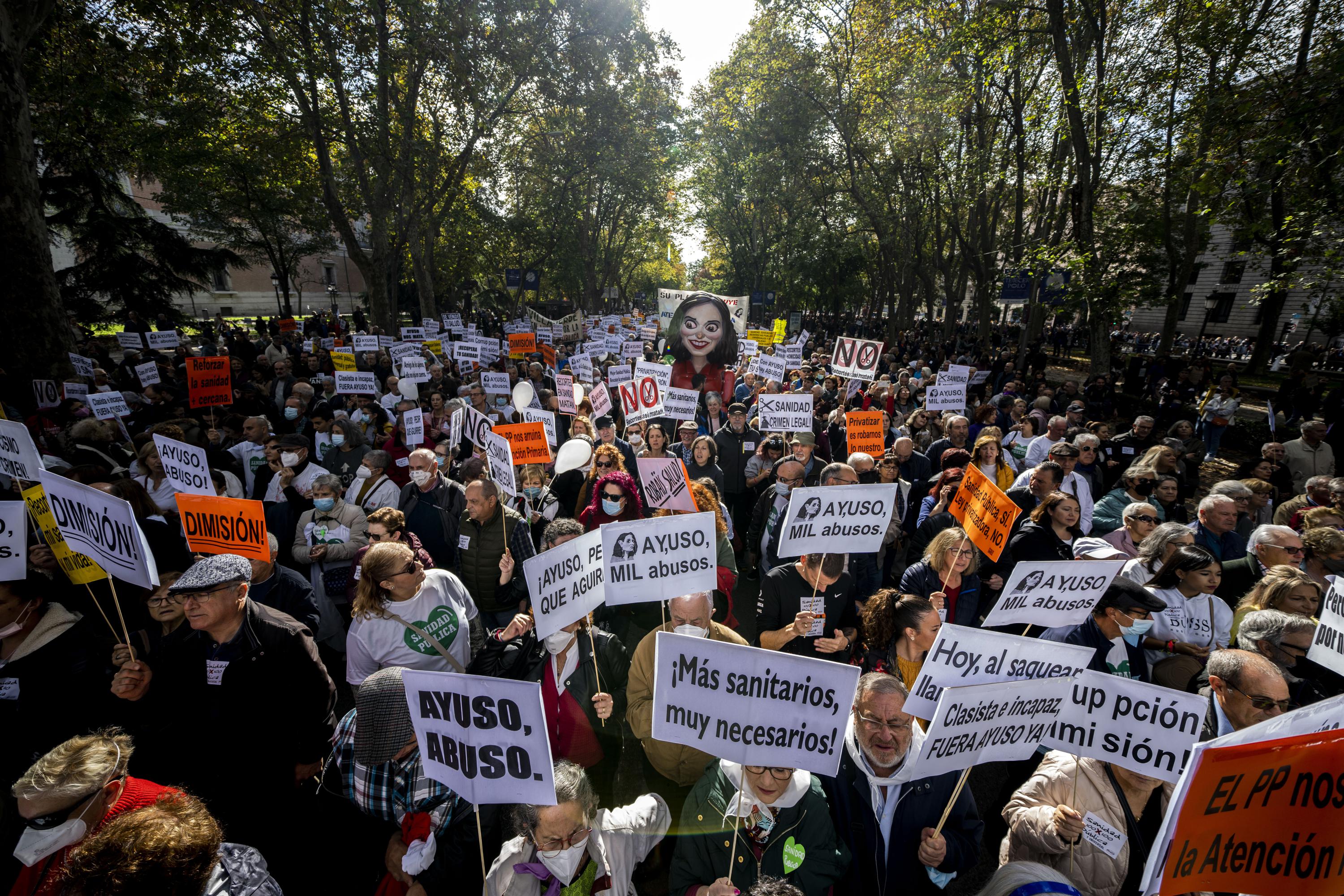 Thousands protest in support of public health care in Madrid | AP News