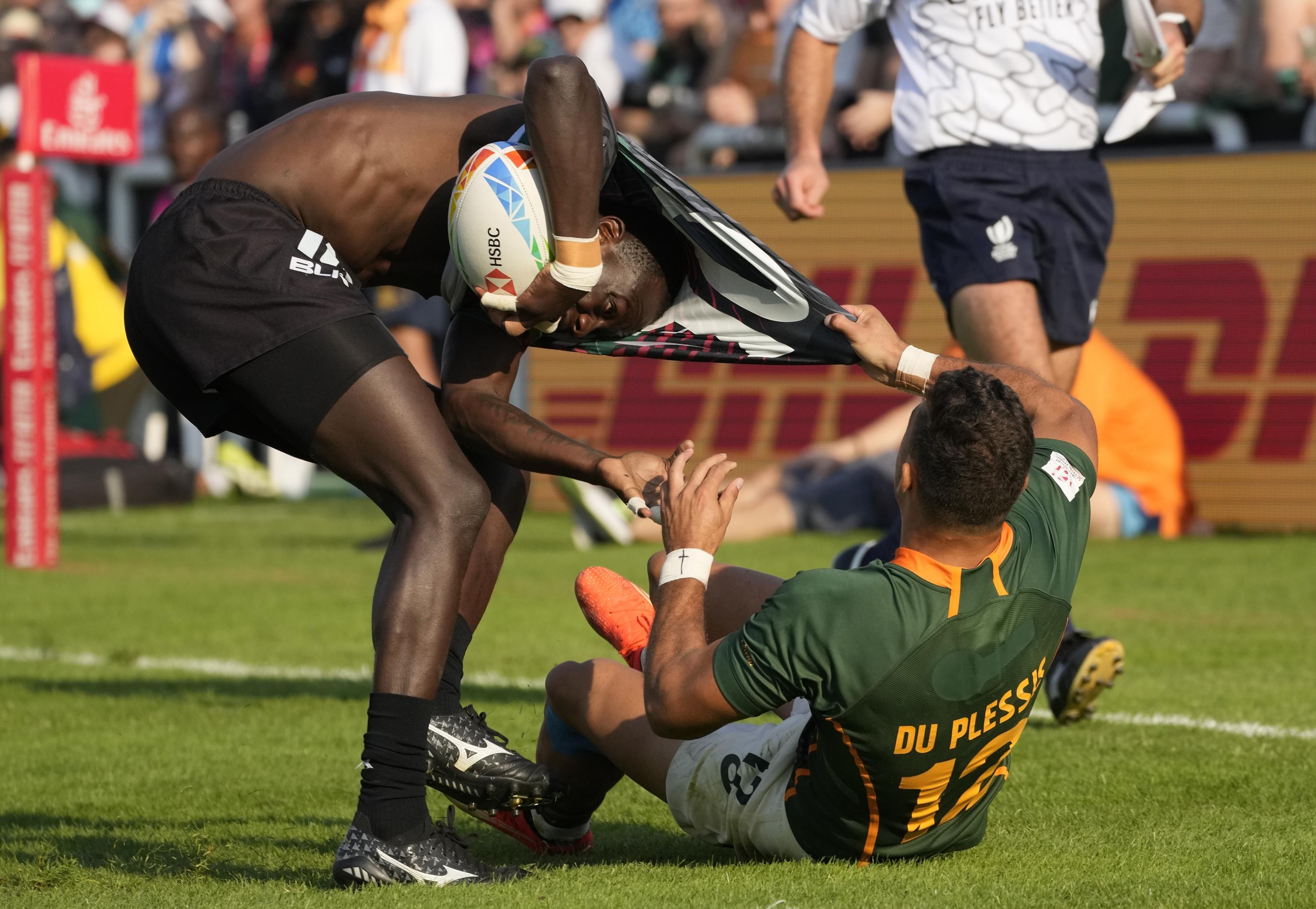 Fiji fail to advance from pool at Dubai Sevens | AP News