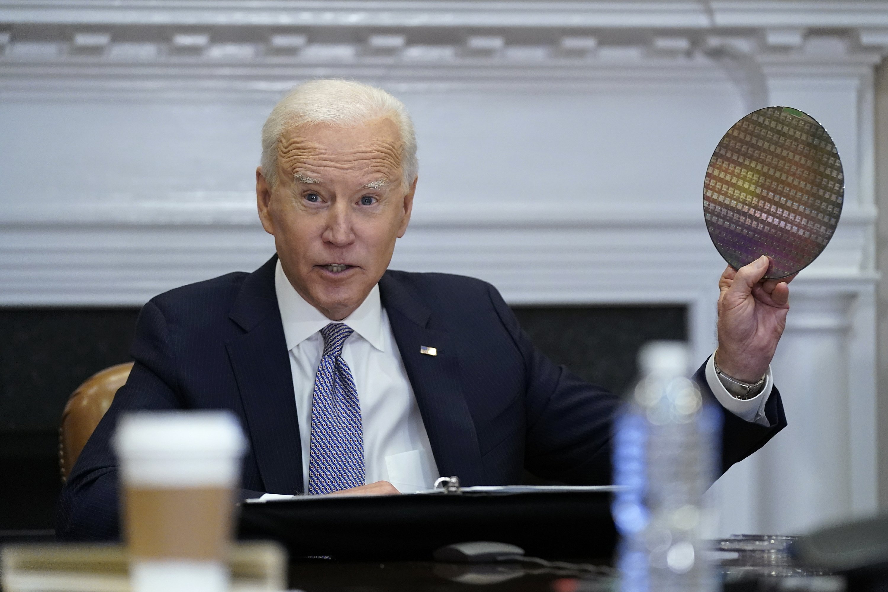 Biden tells execs US needs to invest, lead in computer chips | AP News