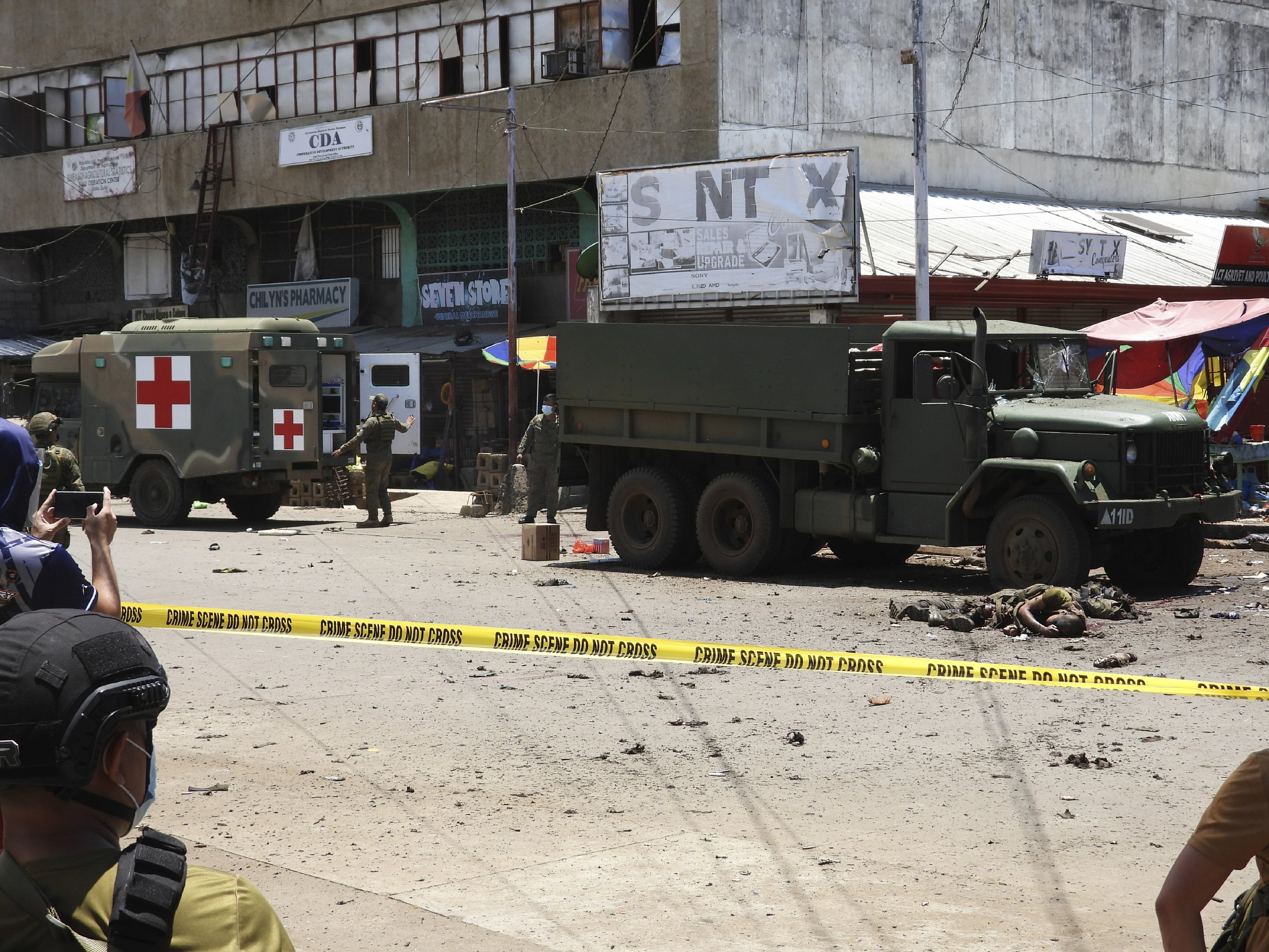 14 killed, 75 wounded in bomb attacks in south Philippines | AP News