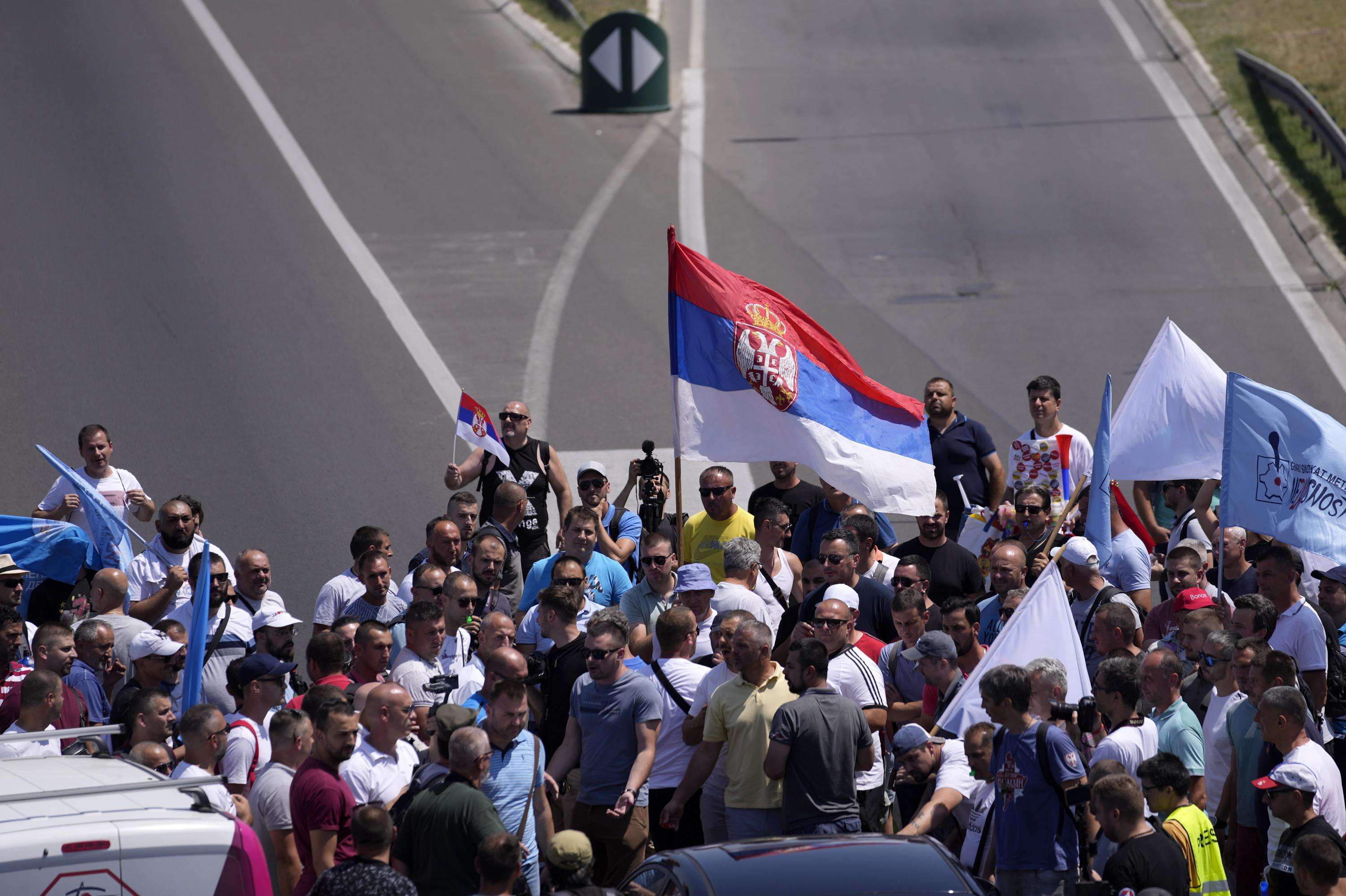 Car factory workers block key motorway in Serbia capital | AP News