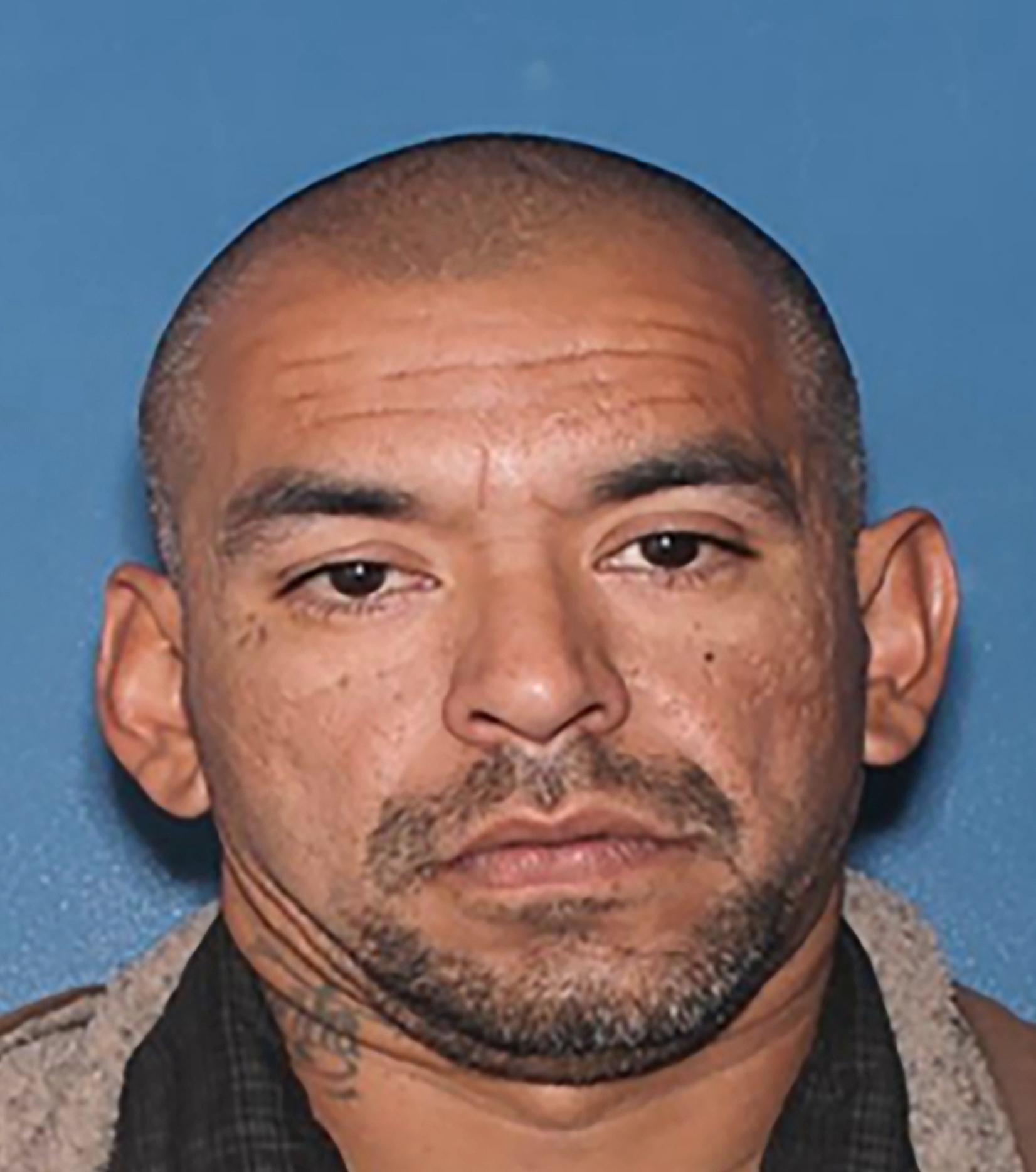 Police: Body believed to be suspect in officer shooting | AP News