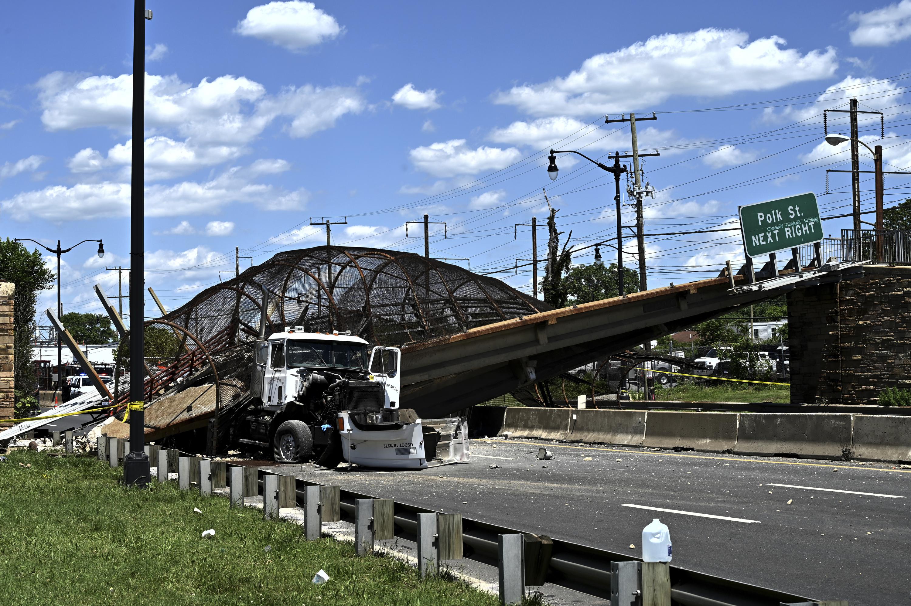 Pedestrian bridge collapses over DC highway, injuring 5 | AP News