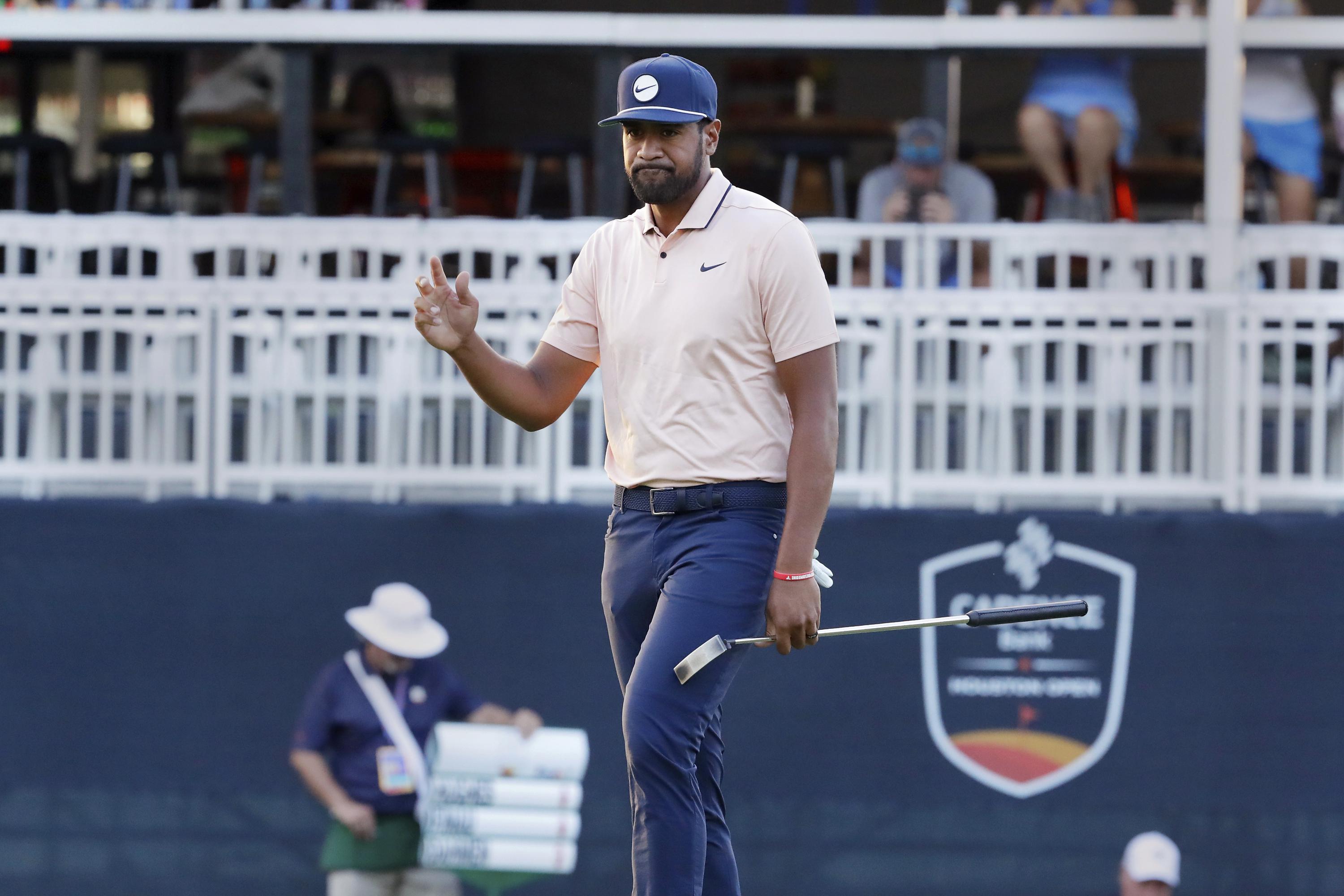Finau hoping for big end to big year, shares Houston lead | AP News