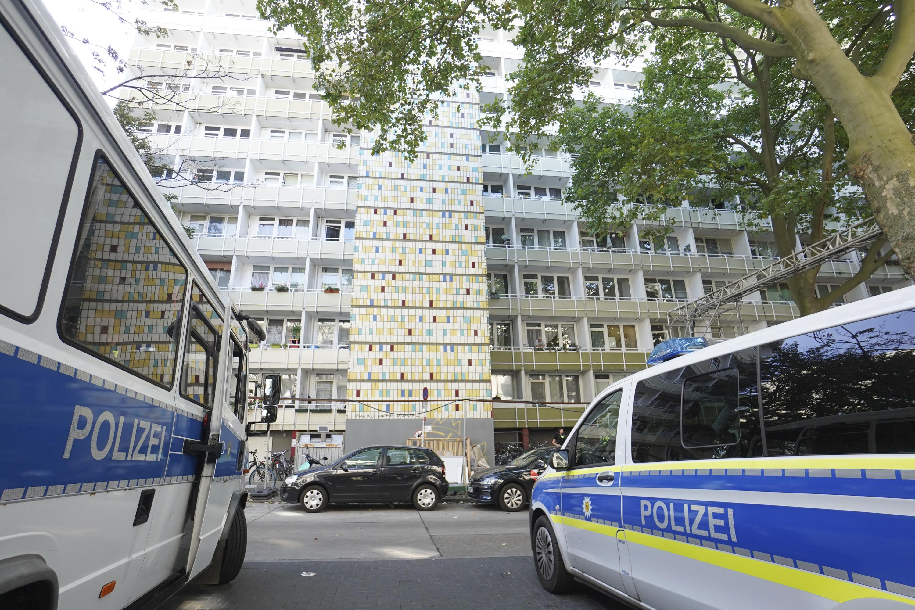 Berlin police fatally shoot man who killed woman with ax | AP News