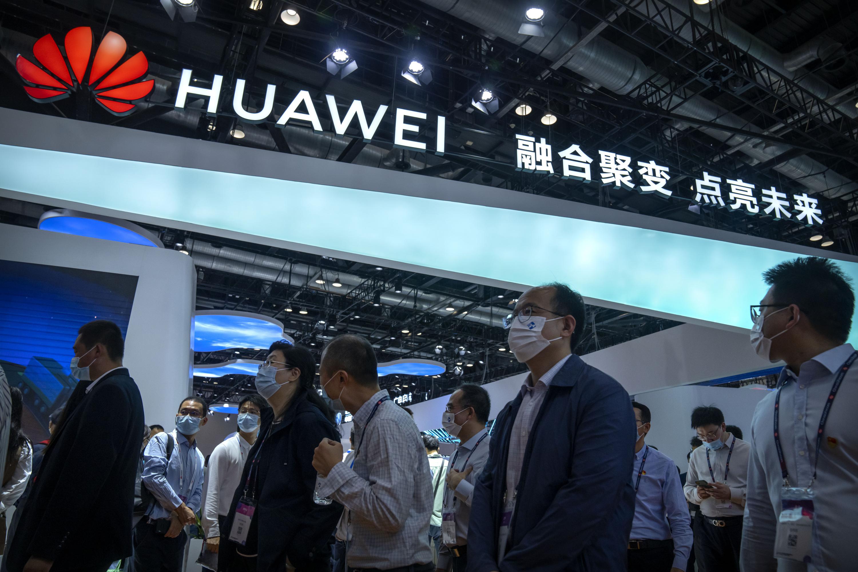 China's Huawei says revenue down 2.2% so far this year | AP News