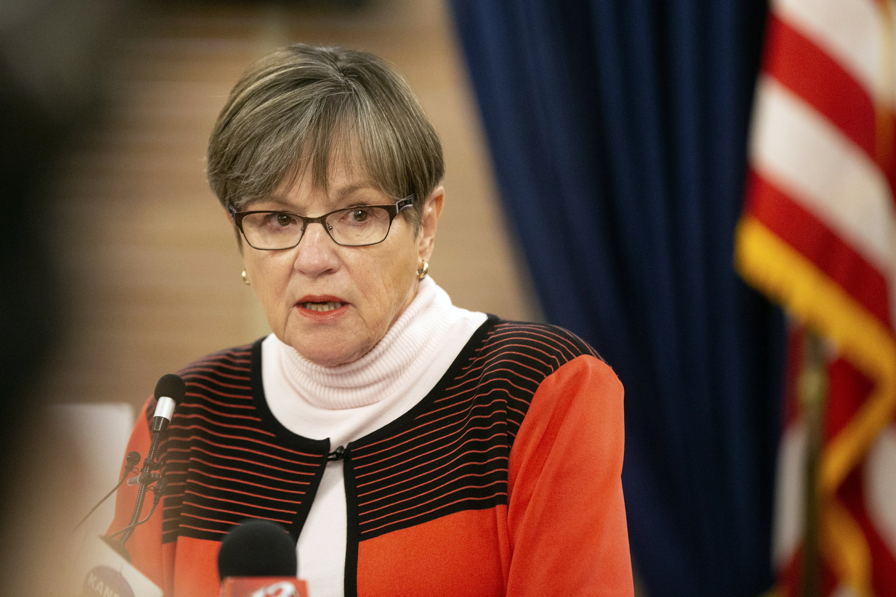 Kansas sees new COVID highs; Kelly not dropping mask mandate | AP News