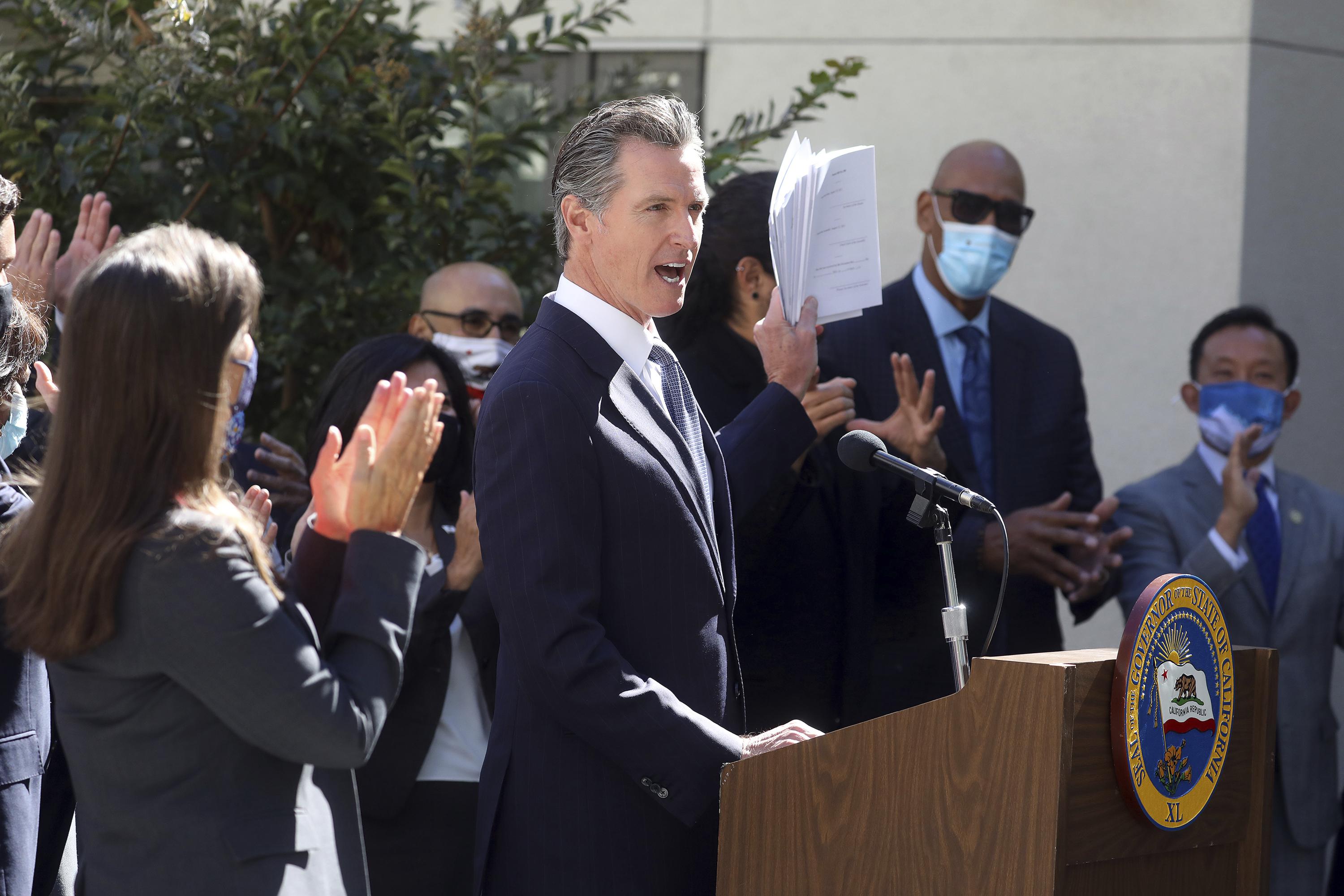 California governor signs laws aimed at homeless crisis | AP News