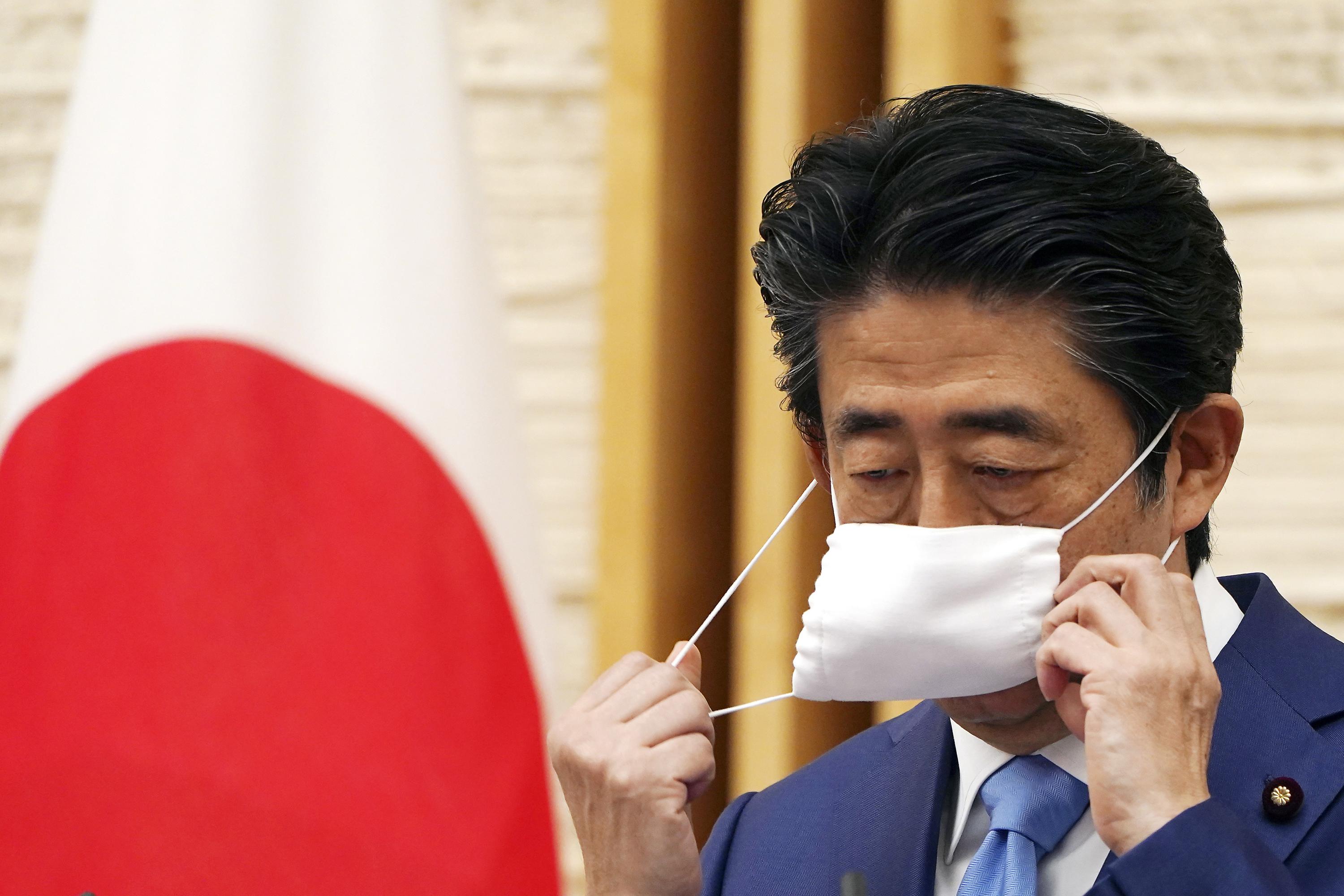Millions of unused cloth masks remain in storage in Japan | AP News