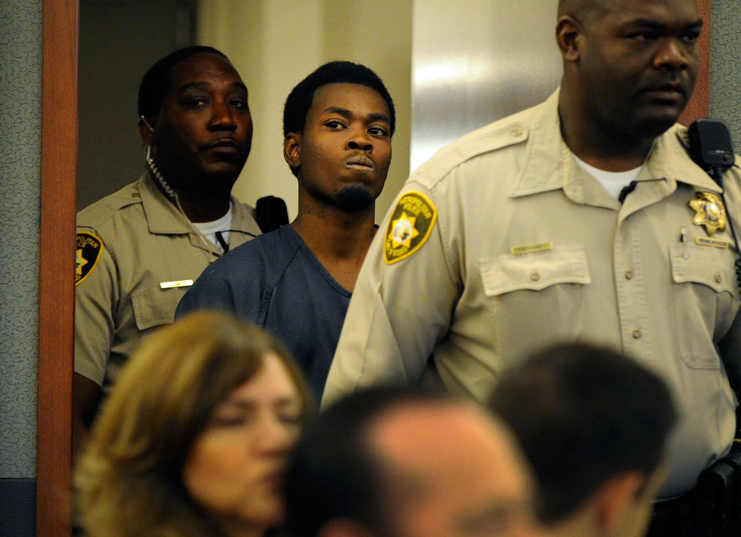 Not guilty plea in Vegas bloody home slaying case | AP News