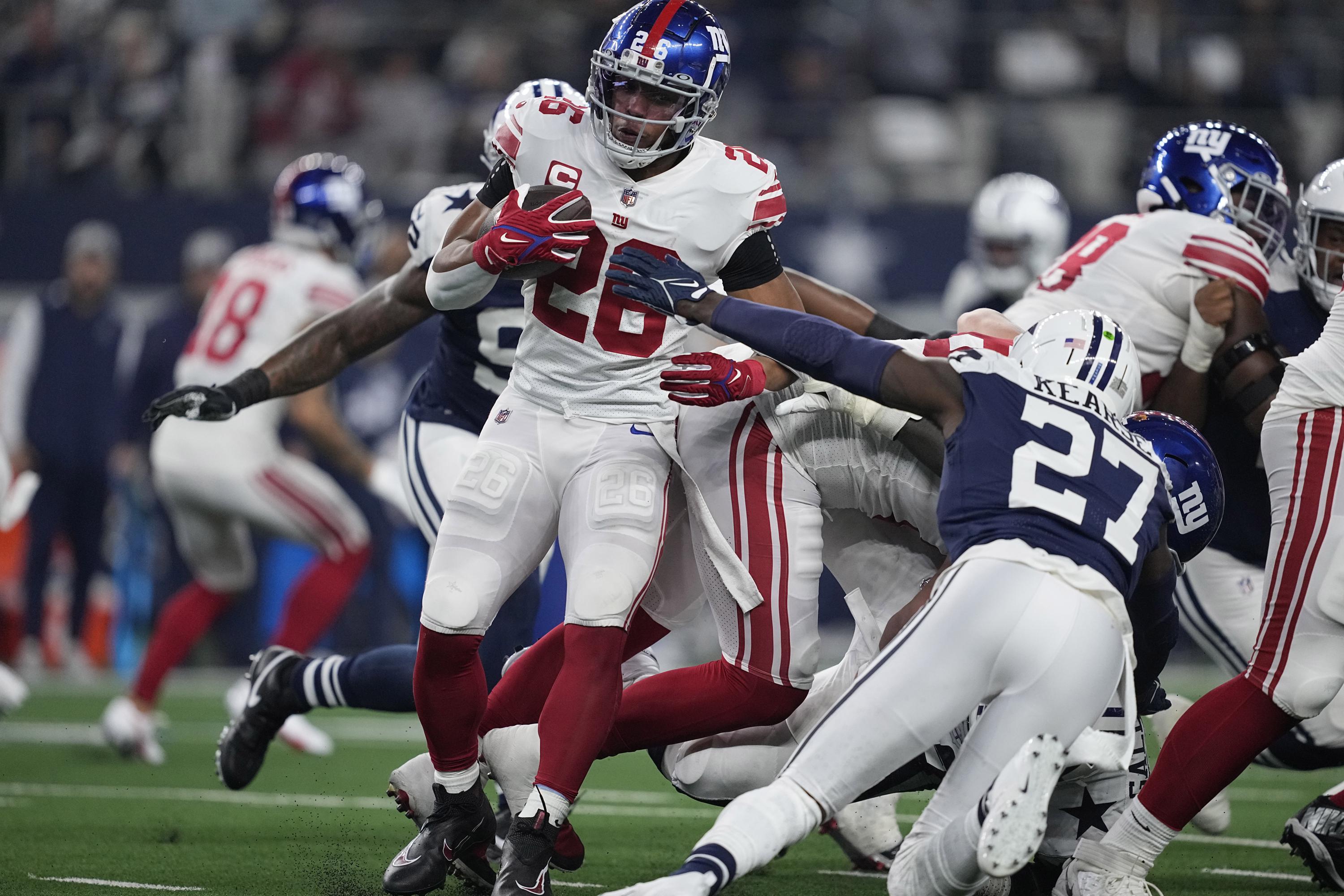 Giants feel pressure to restart stalled running game | AP News