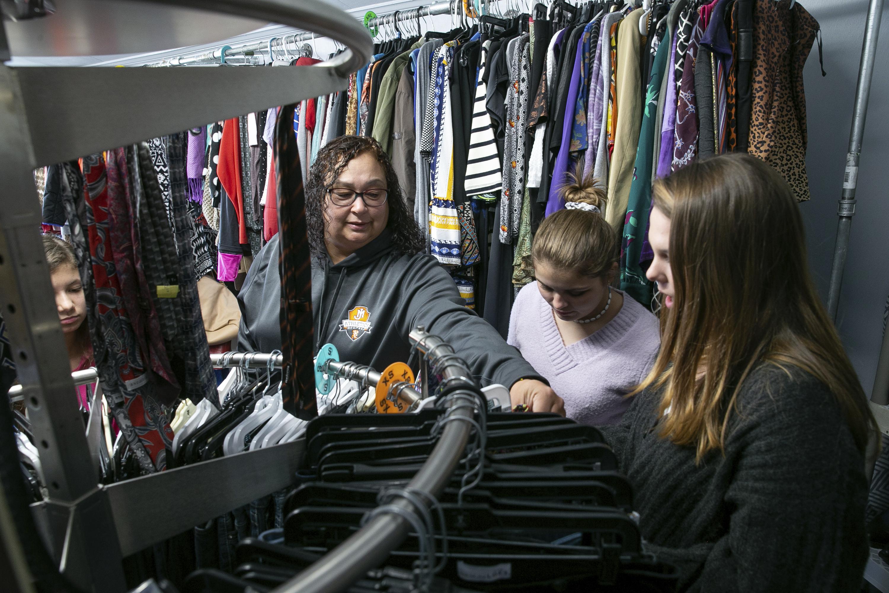 Clothing donations help boost morale, reduce absenteeism | AP News