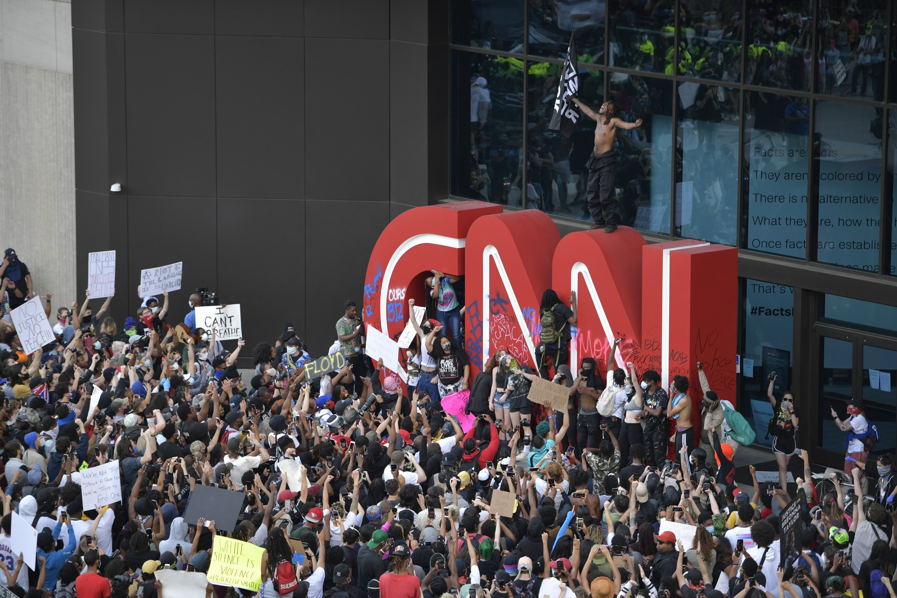 Atlanta protest scattered by tear gas, heavy police presence | AP News