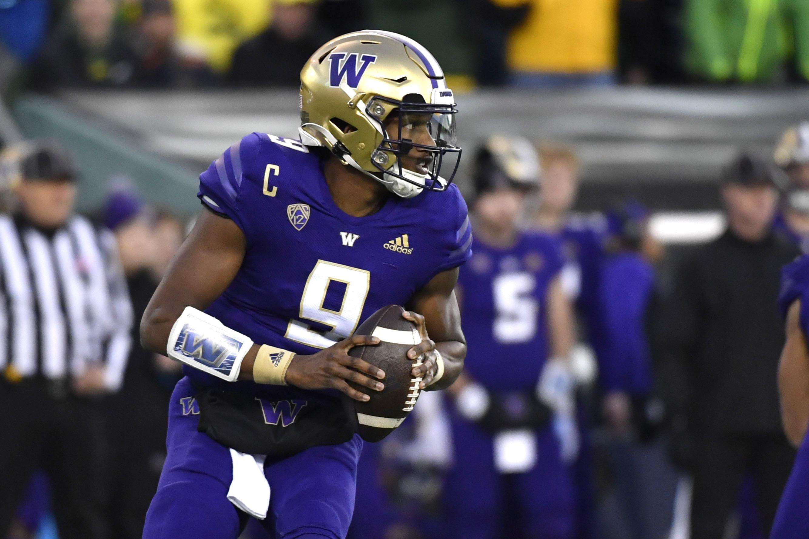 No. 24 Washington rallies late, topples No. 6 Oregon 37-34 | AP News