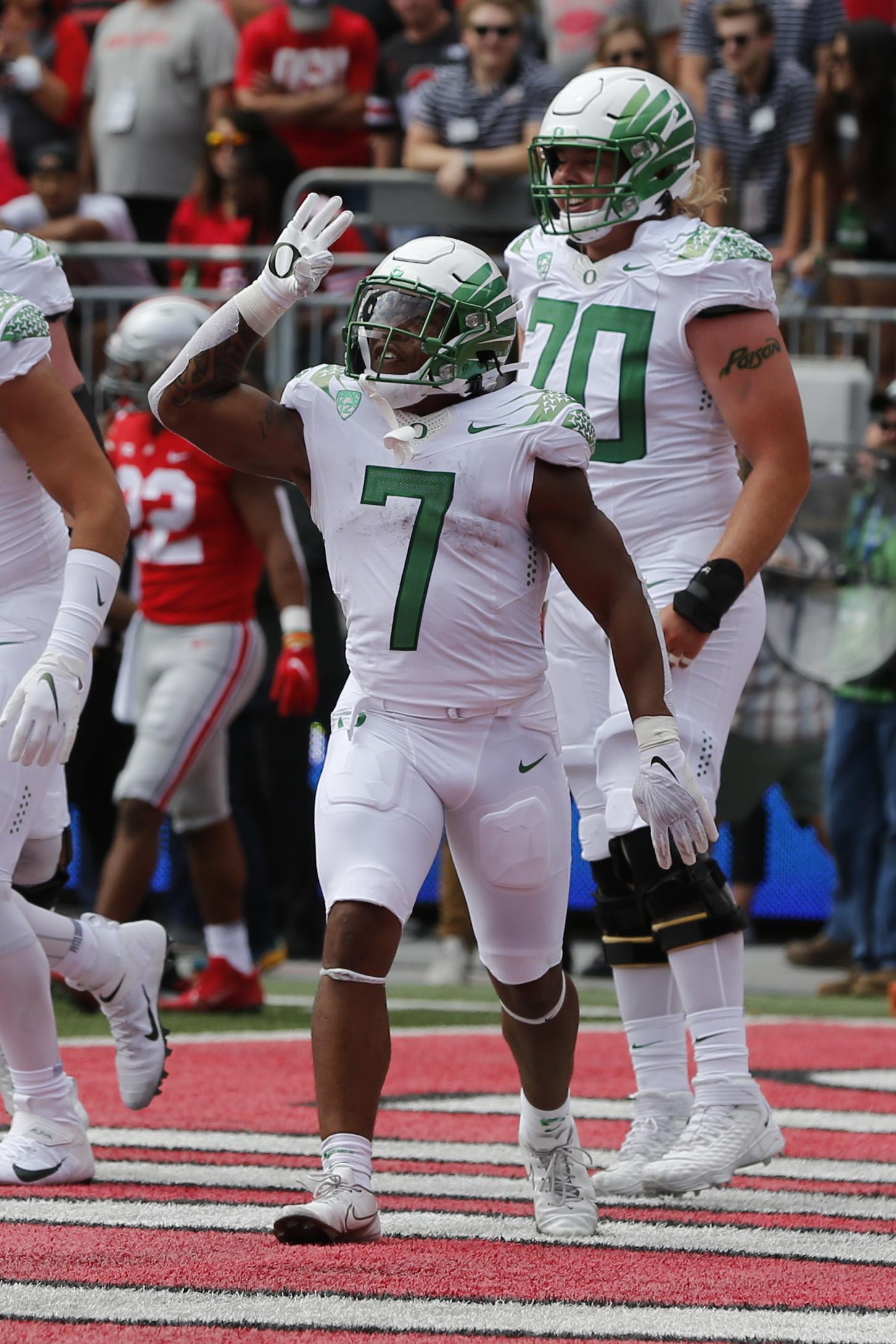 College Football Today: Oregon's Verdell runs for 3 TDs | AP News