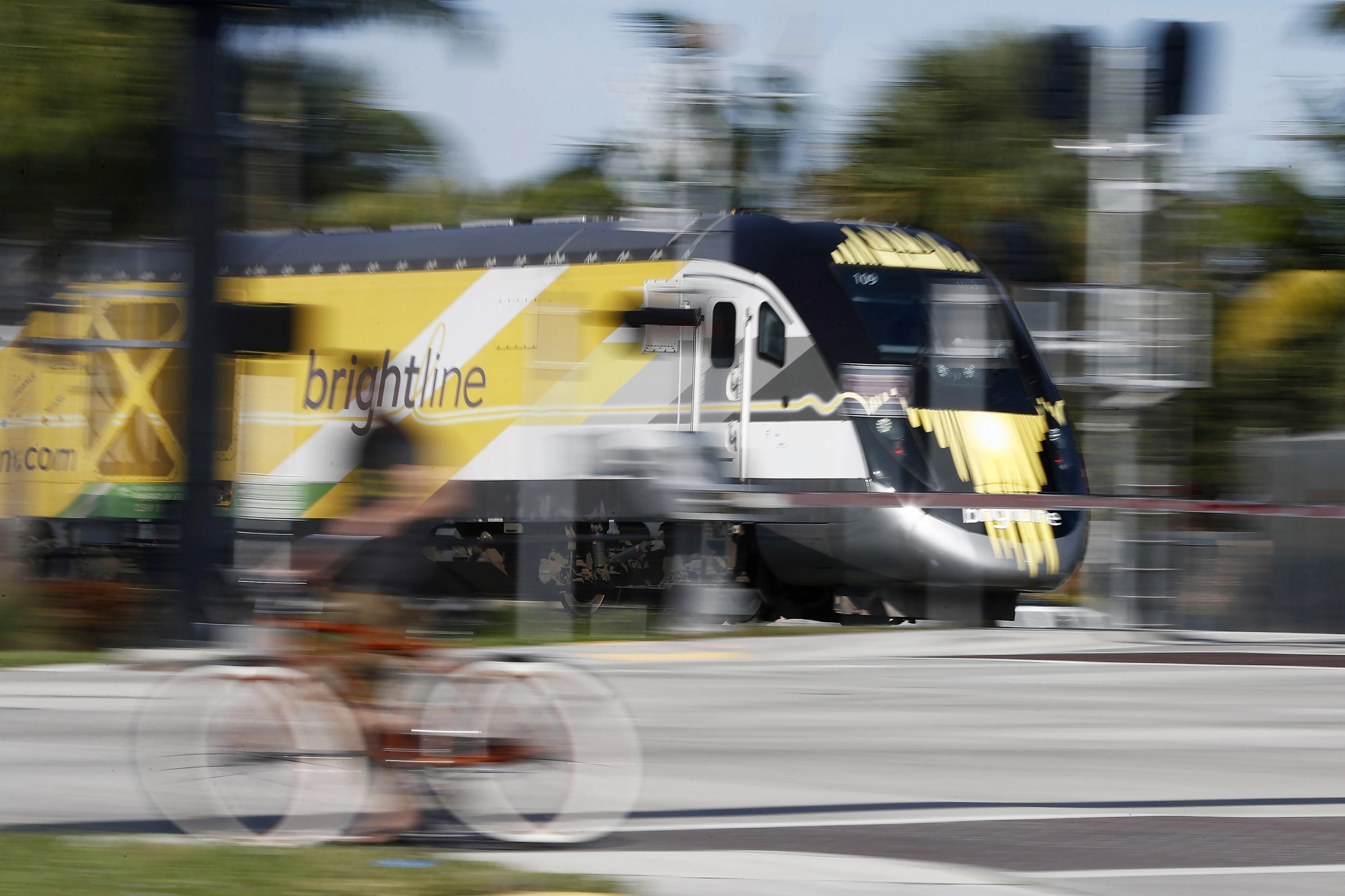 Officials: Man walks onto tracks, is killed by Florida train | AP News