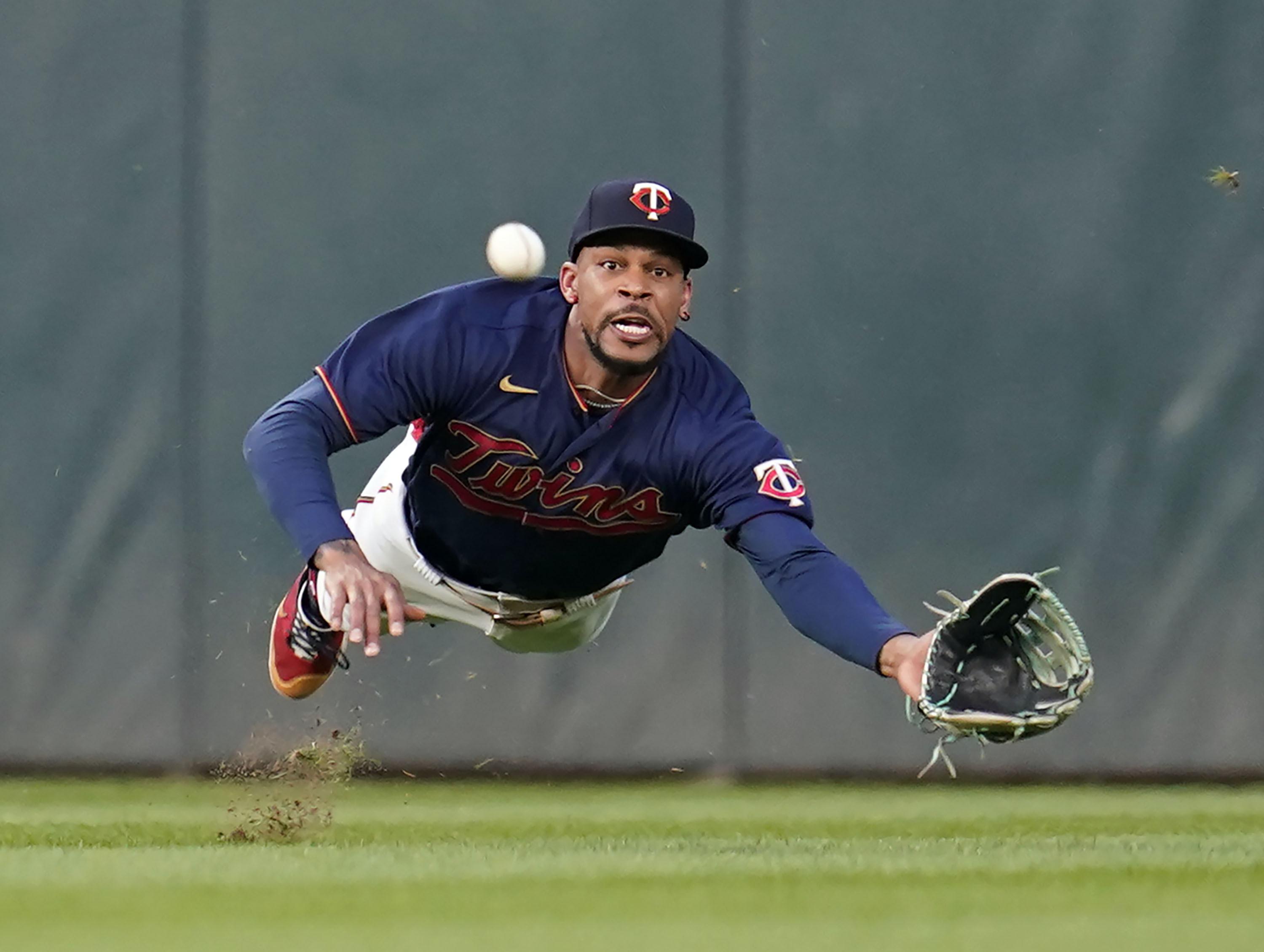 Buxton early exit, Twins fall; Garcia HR, Texas takes 3 of 4 | AP News