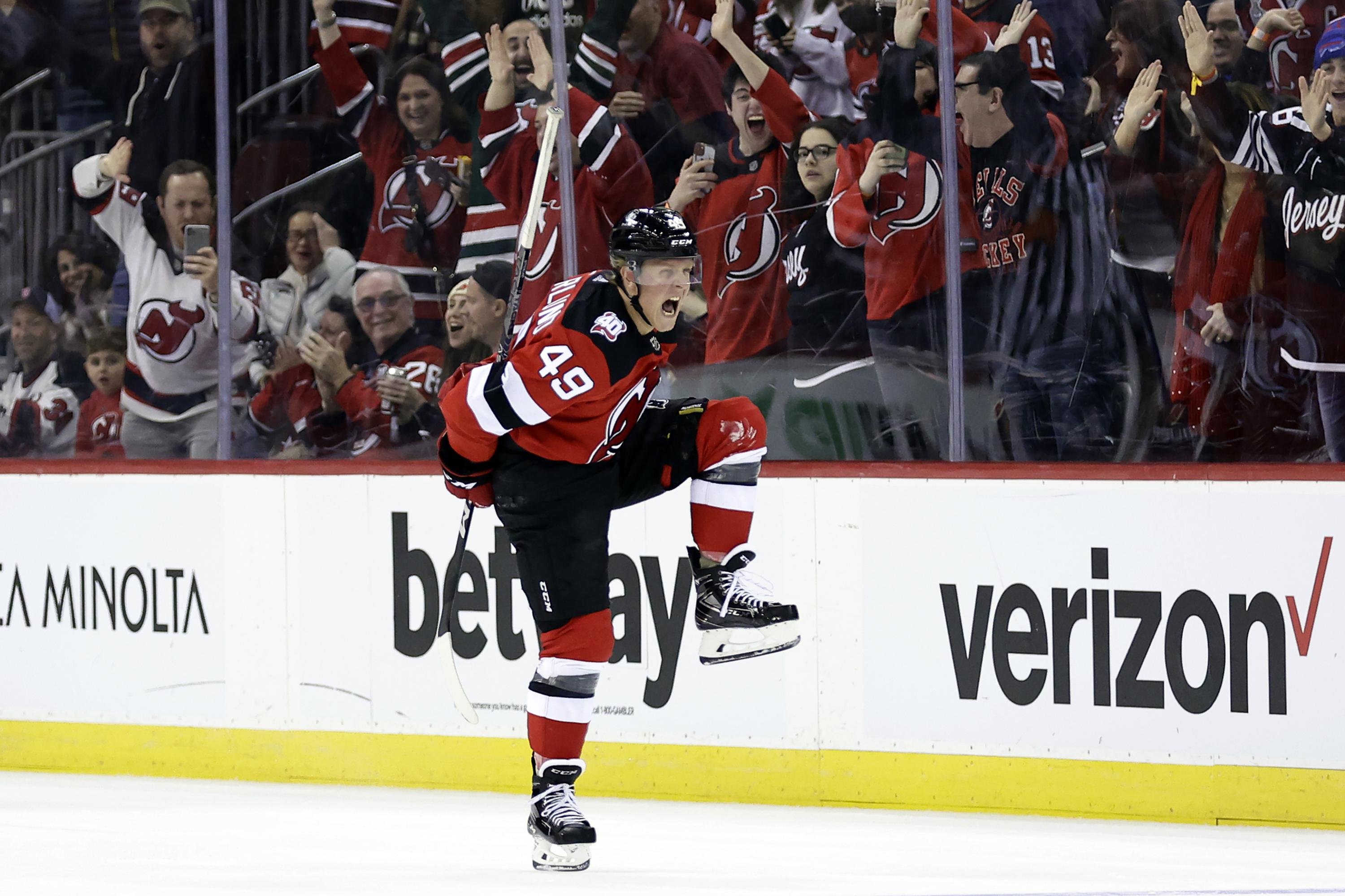 Hughes has first NHL hat trick, Devils beat Capitals 5-1 | AP News
