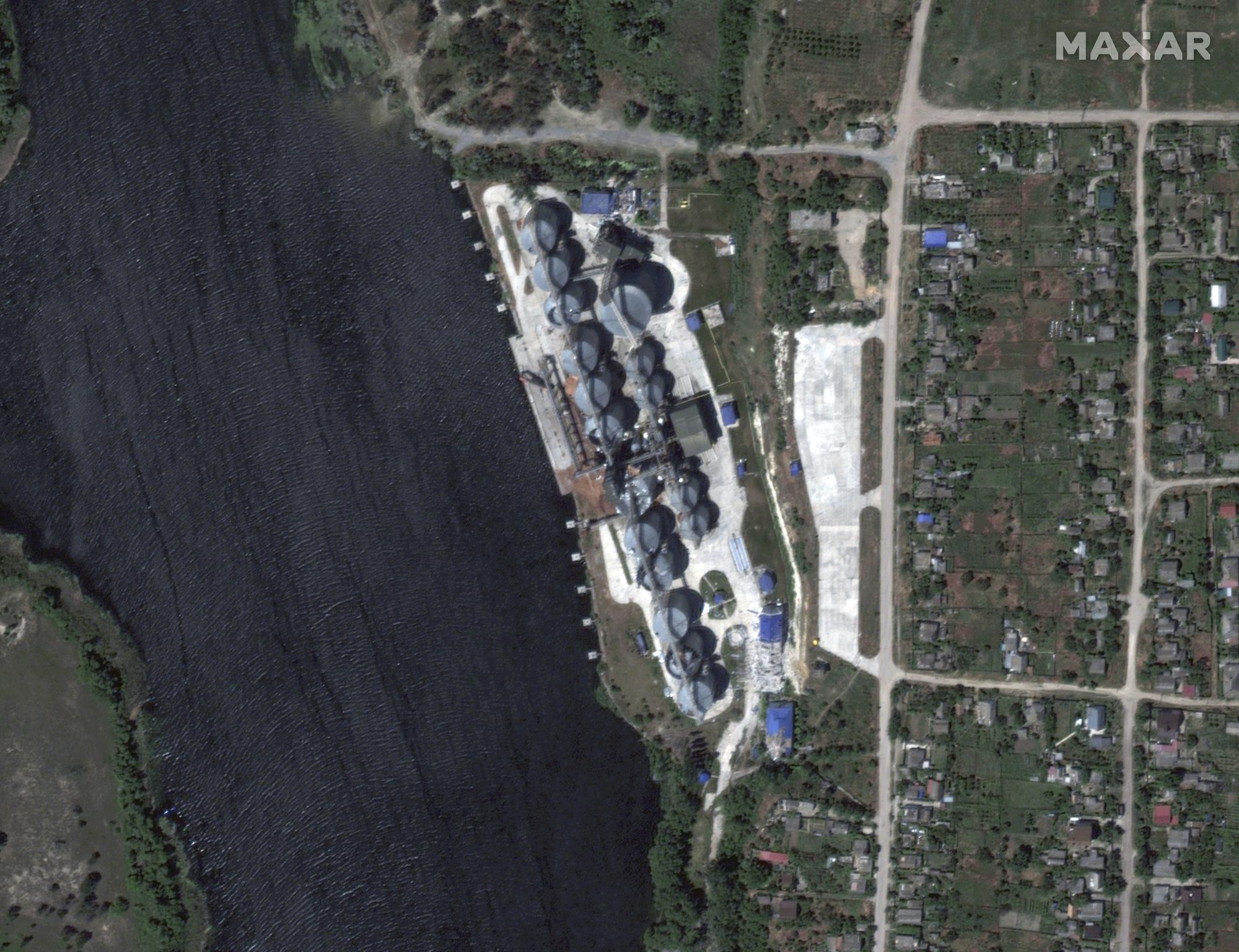 Before-and-after satellite images show profound toll of Ukraine dam ...