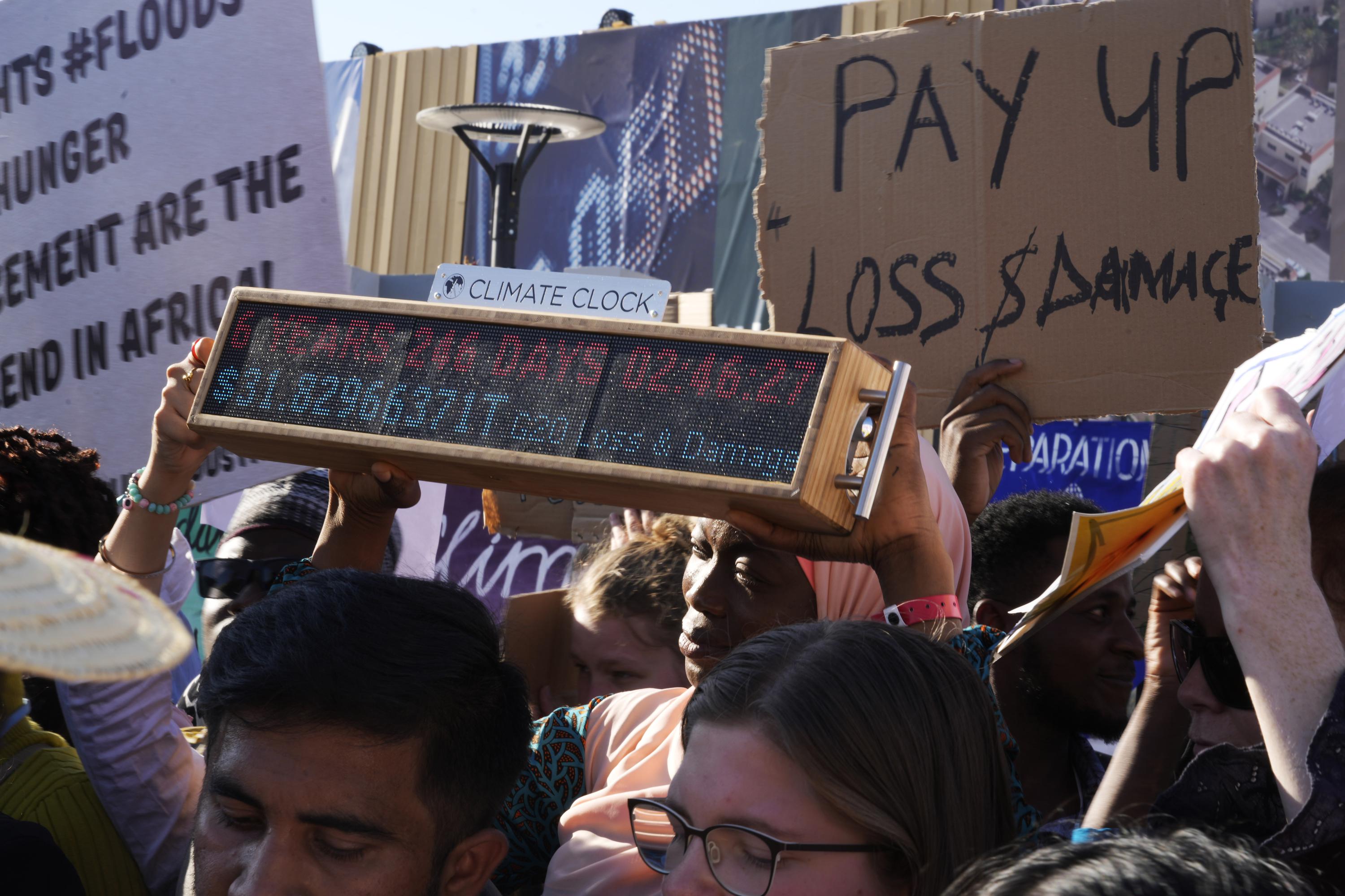 Foundations call for cooperation, some new pledges at COP27 | AP News