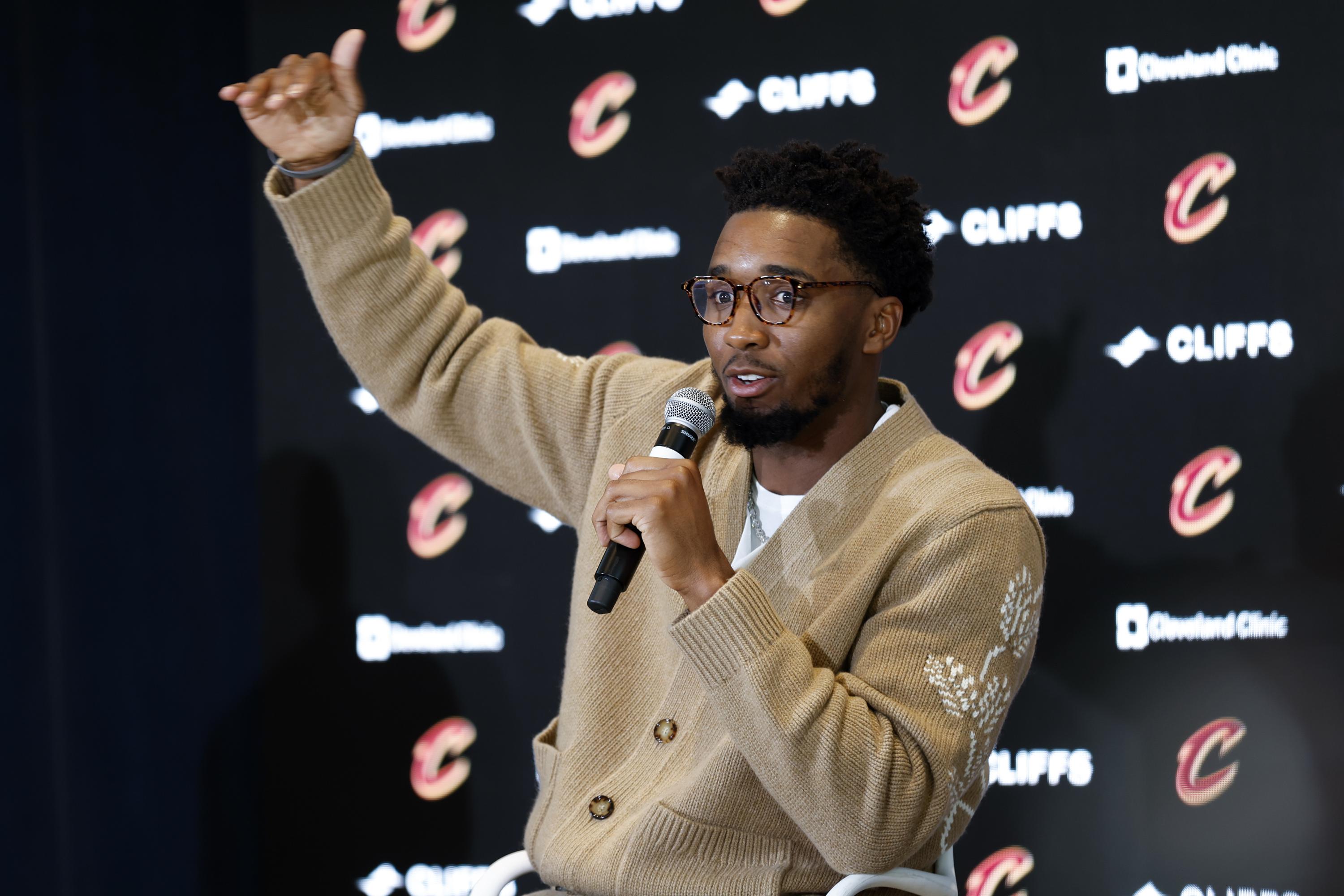 Newest Cavs star Mitchell gets warm welcome in Cleveland | AP News