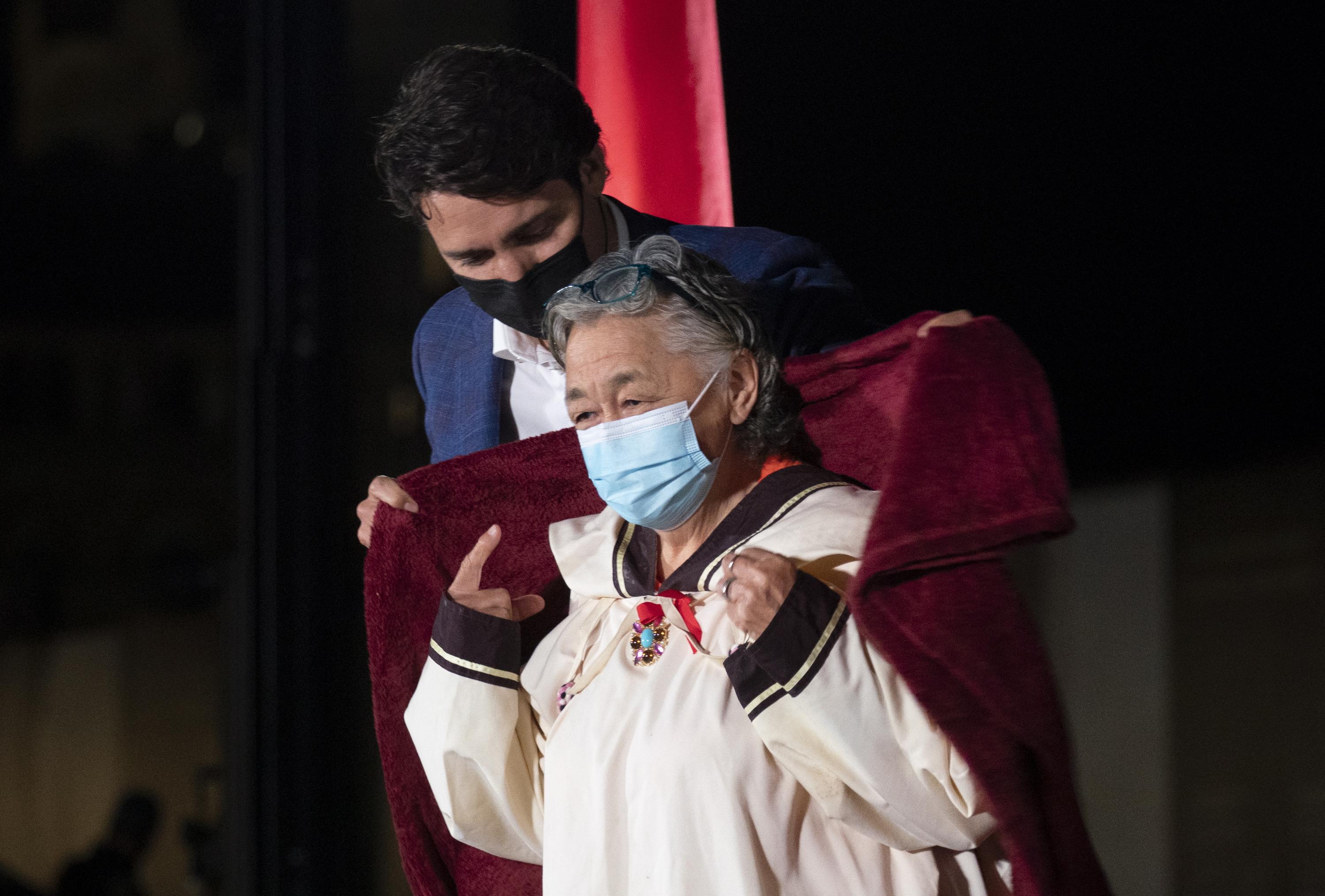 Trudeau says he regrets vacation on Indigenous day | AP News