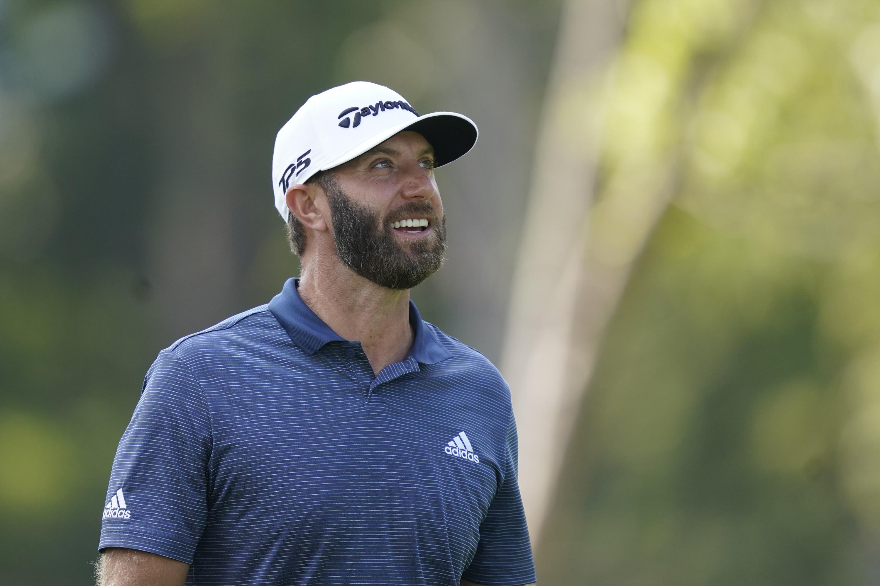 Dustin Johnson stays in groove, opens with 63 at LIV-Chicago | AP News