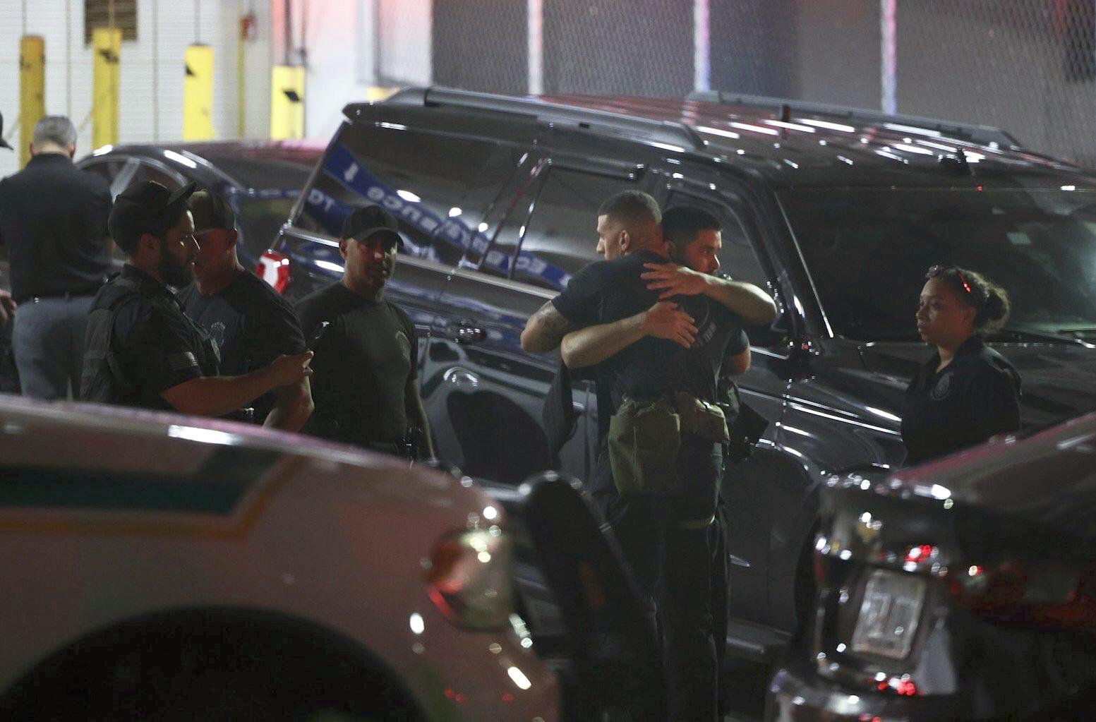 Miami-Dade officer critical after shooting; suspect killed | AP News