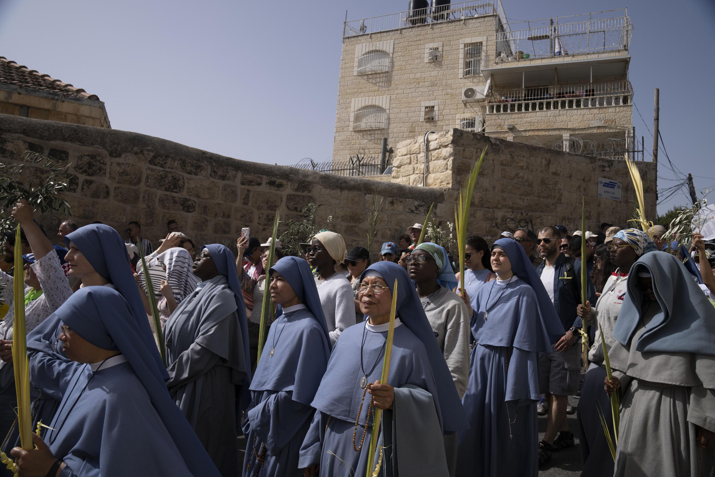 Christians mark Palm Sunday with Jerusalem procession | AP News