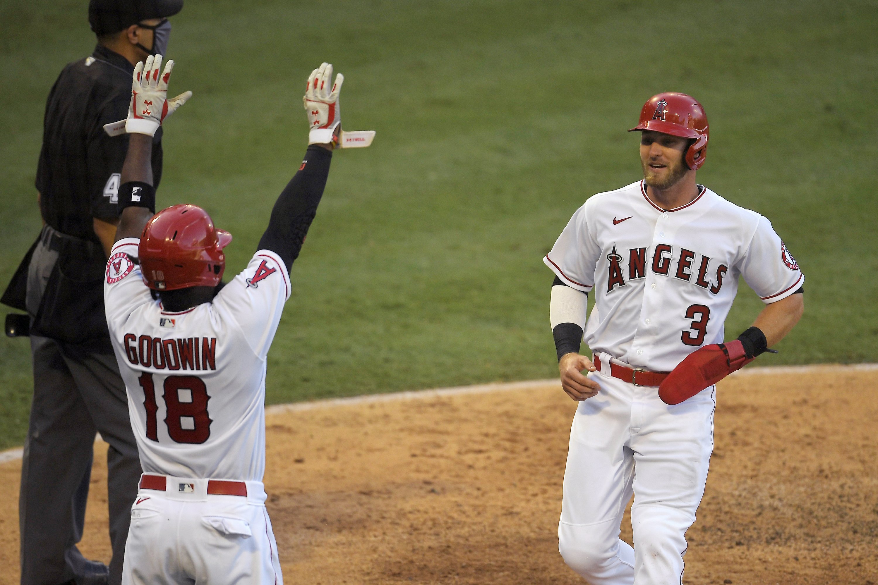 Angels recover after giving up late lead, beat Astros in 10 | AP News