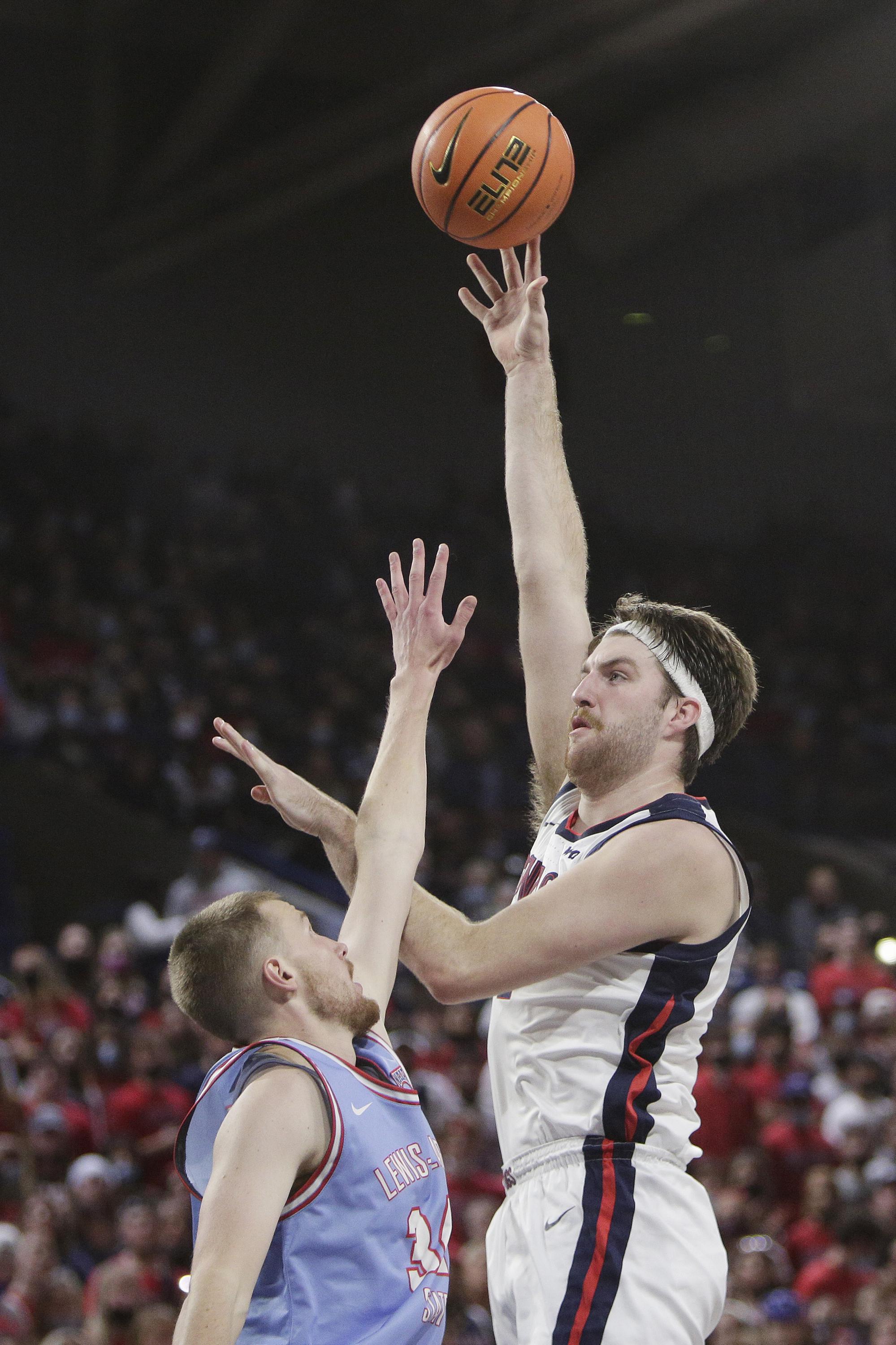 College basketball ready to rev up with fans in the stands | AP News