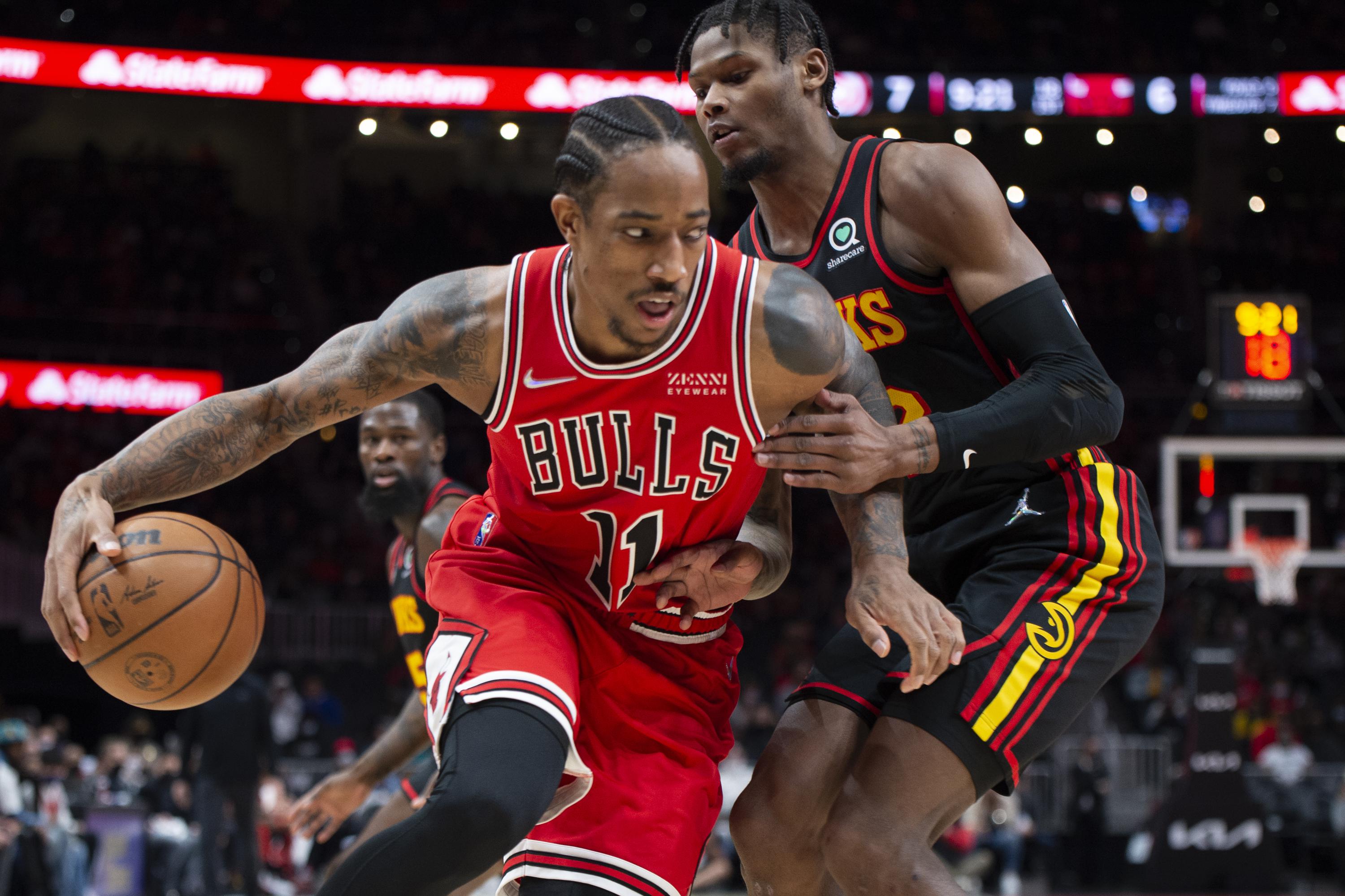 DeRozan, LaVine, Vucevic power Bulls past Hawks 130-118 | AP News