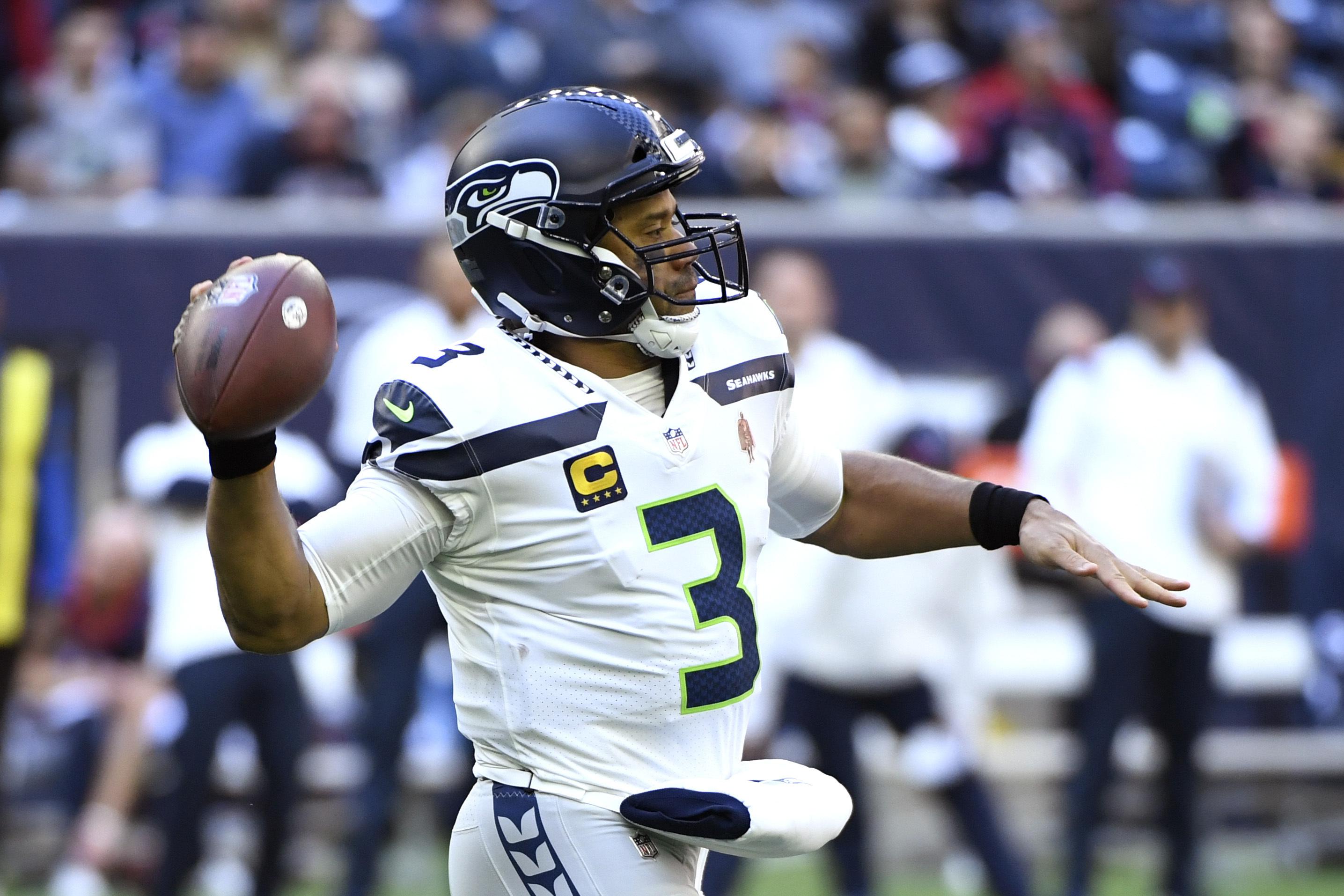 Wilson has 2 TD passes as Seahawks beat Texans 33-13 | AP News
