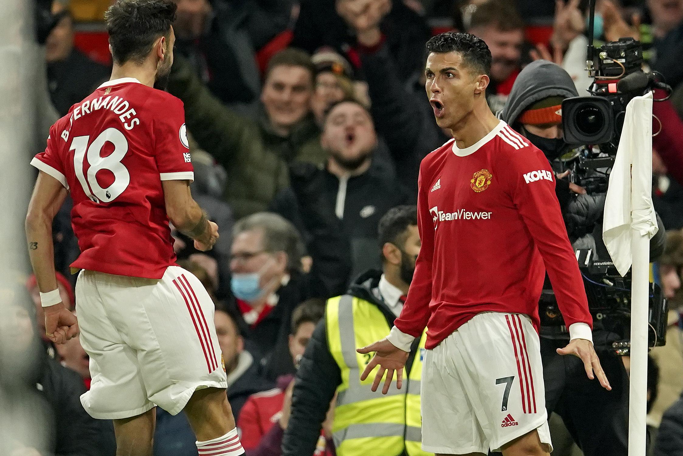 Ronaldo double earns EPL win for United in front of Rangnick | AP News