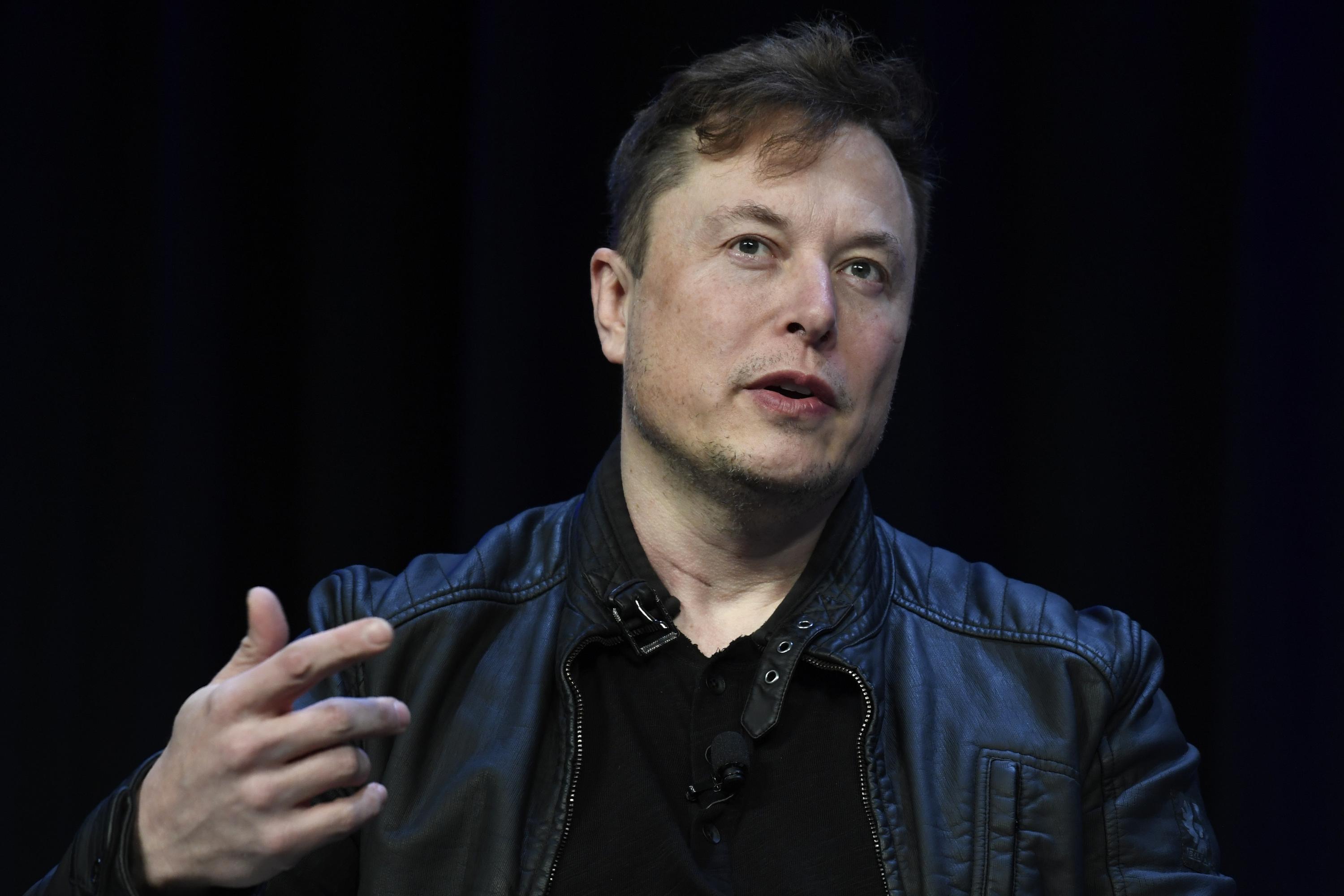 Elon Musk revises Twitter financing plan; shares jump | AP News
