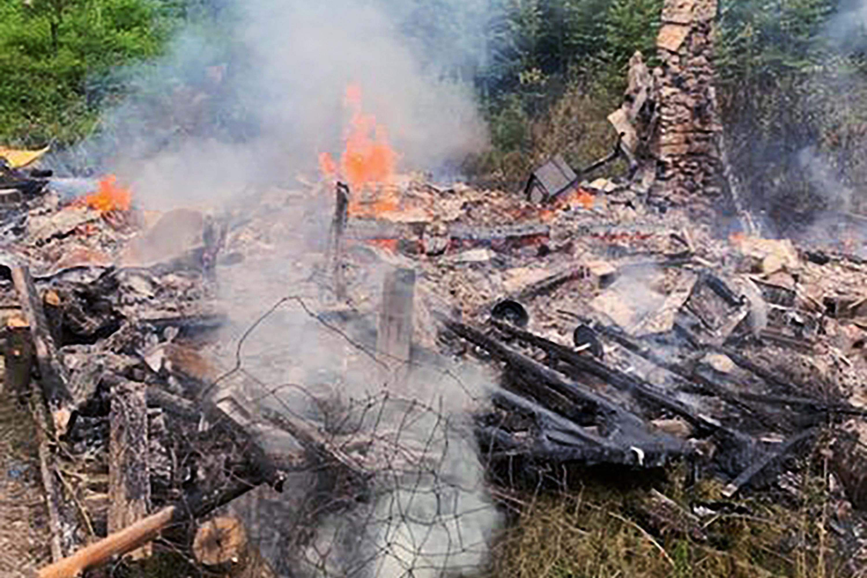 Offers flooding in after woodland hermit's cabin burns down | AP News