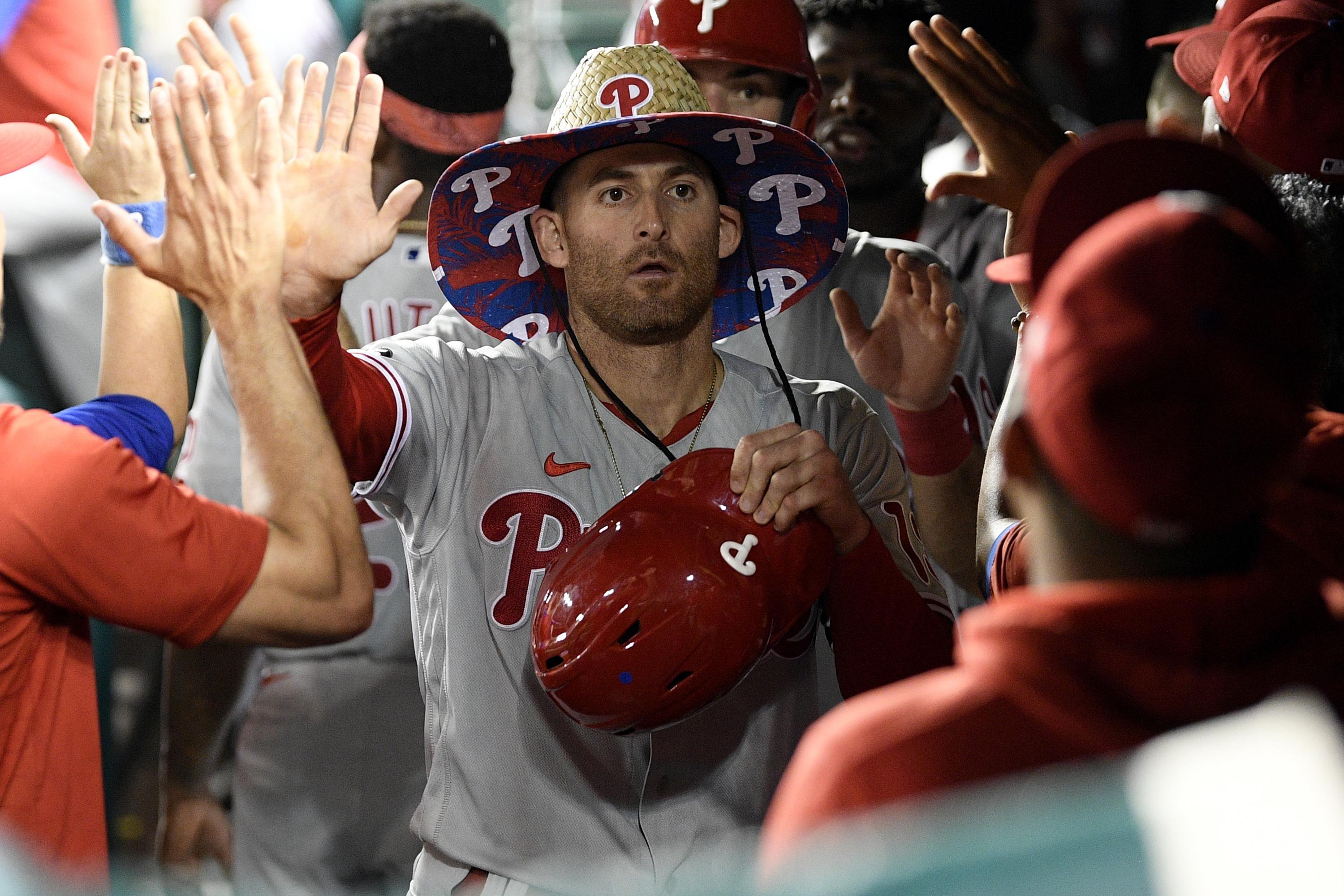 Surging Phillies win 5th in a row, rally past Nationals 12-6 | AP News