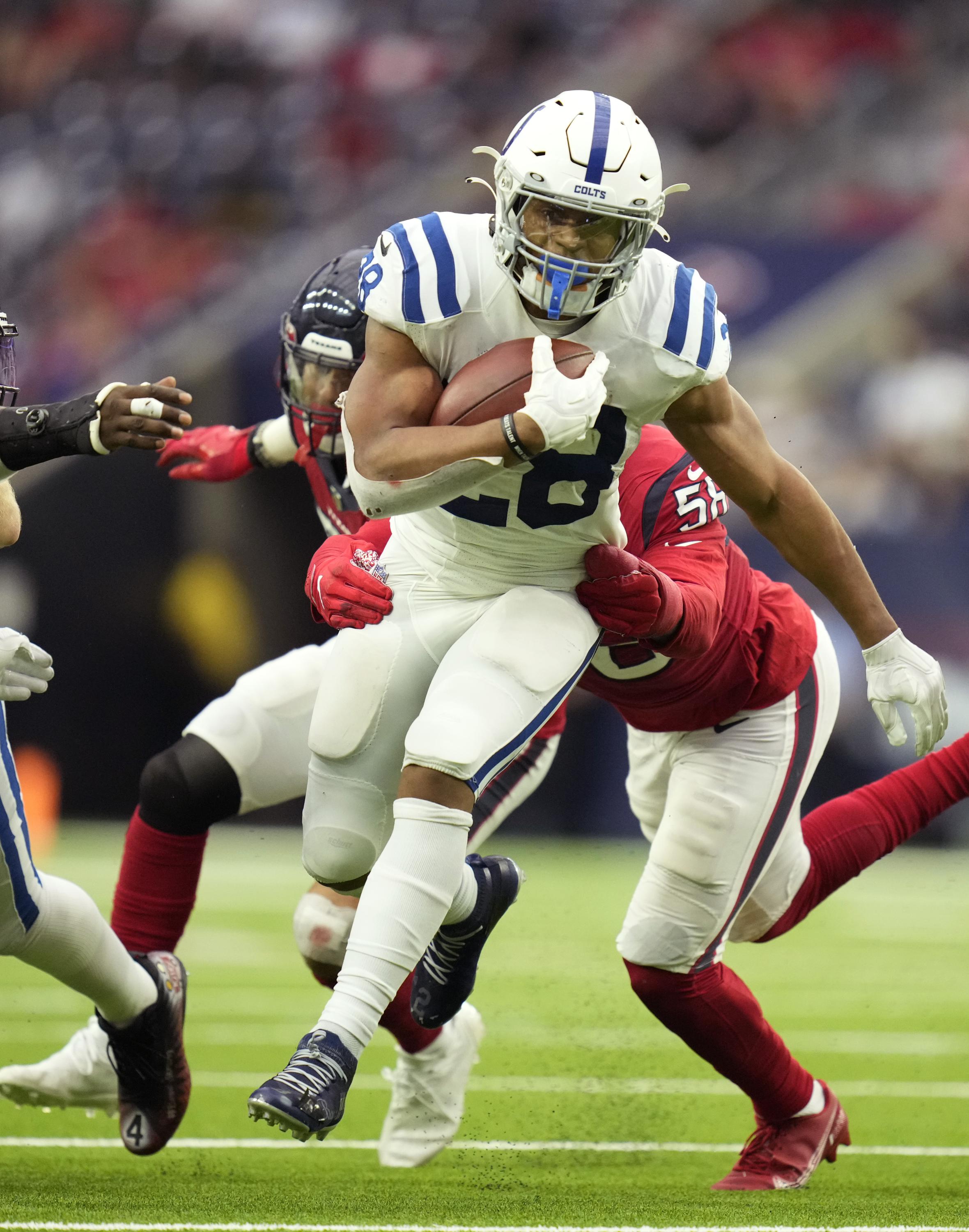 Taylor's two-TD day helps Colts rout woeful Texans 31-0 | AP News