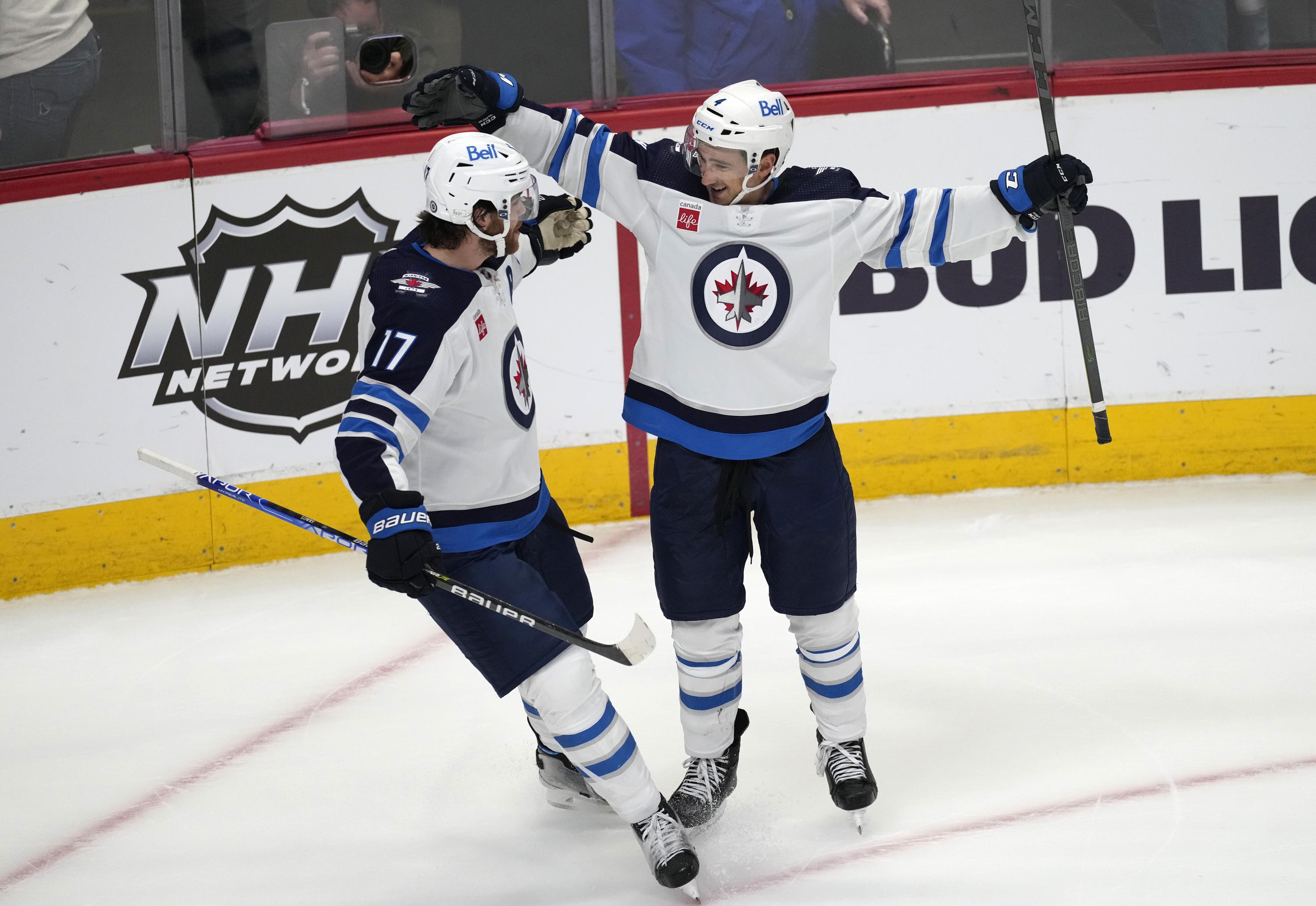 Pionk scores 2nd goal of game in OT, Jets beat Avalanche 4-3 | AP News