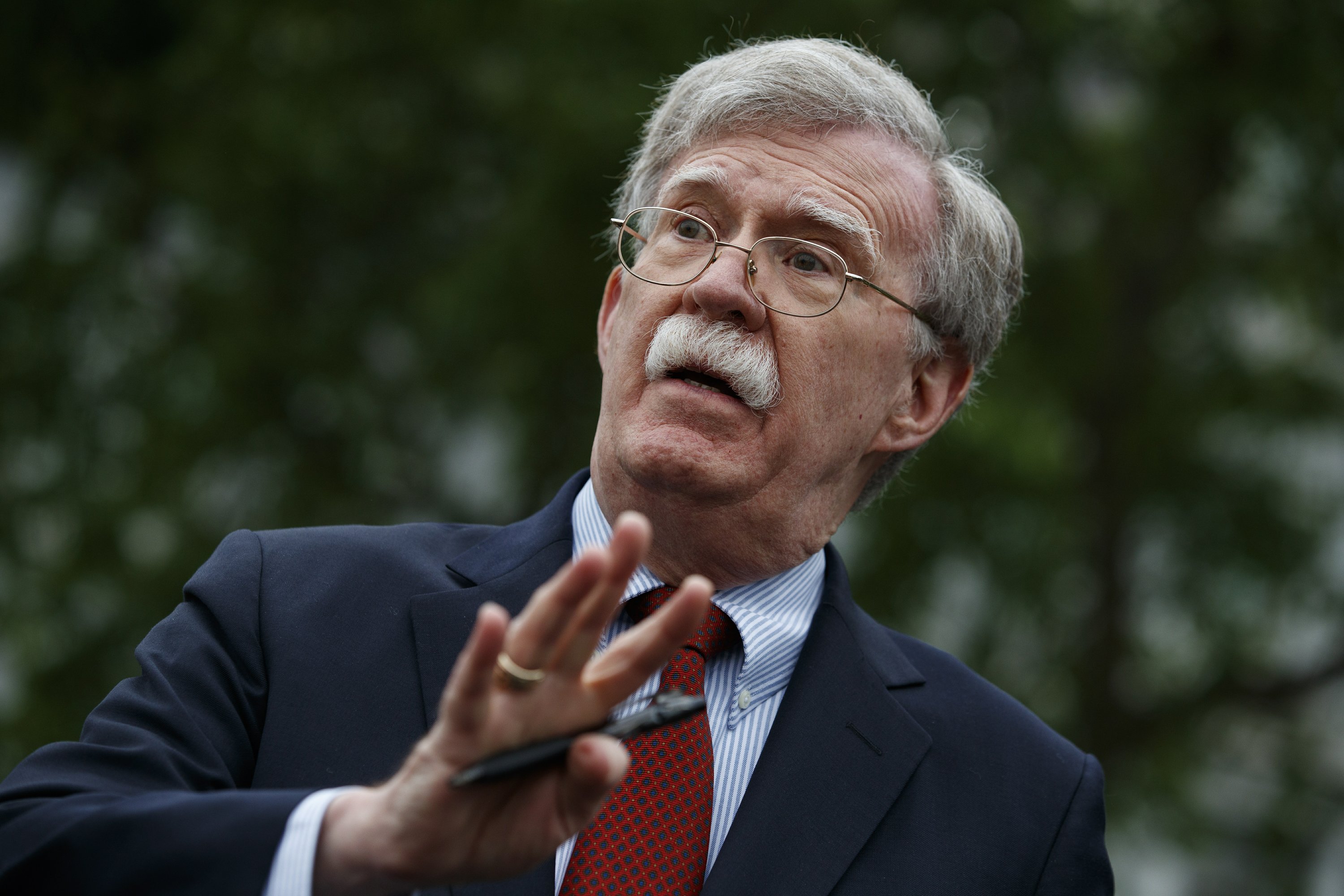 Inside Bolton's exit: Mongolia, a mustache, a tweet | AP News