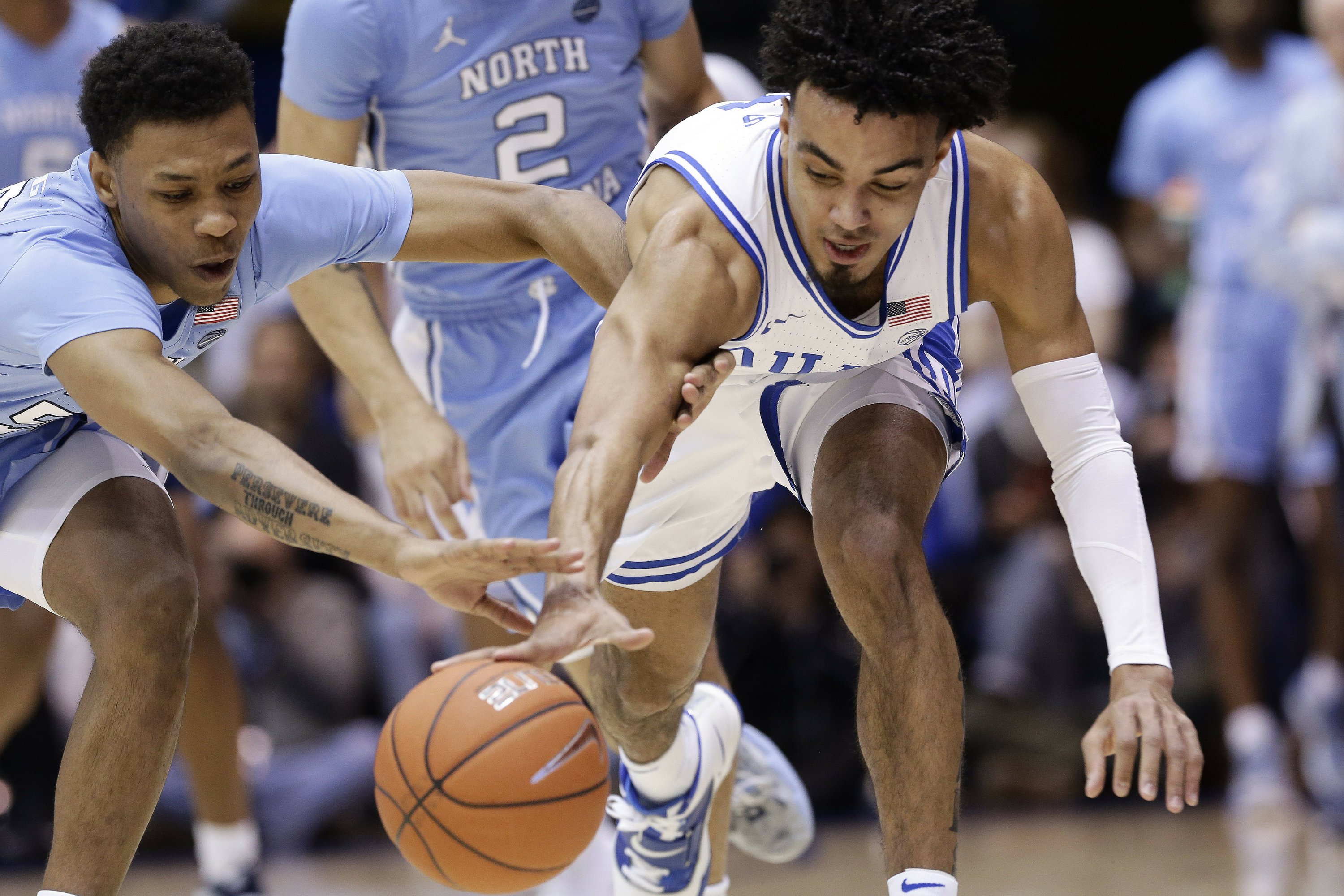 Carey, Robinson help No. 12 Duke beat rival UNC 89-76 | AP News